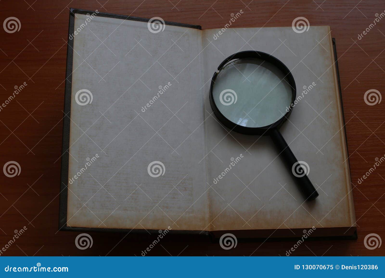 Magnifier on the book stock image. Image of loop, text - 130070675
