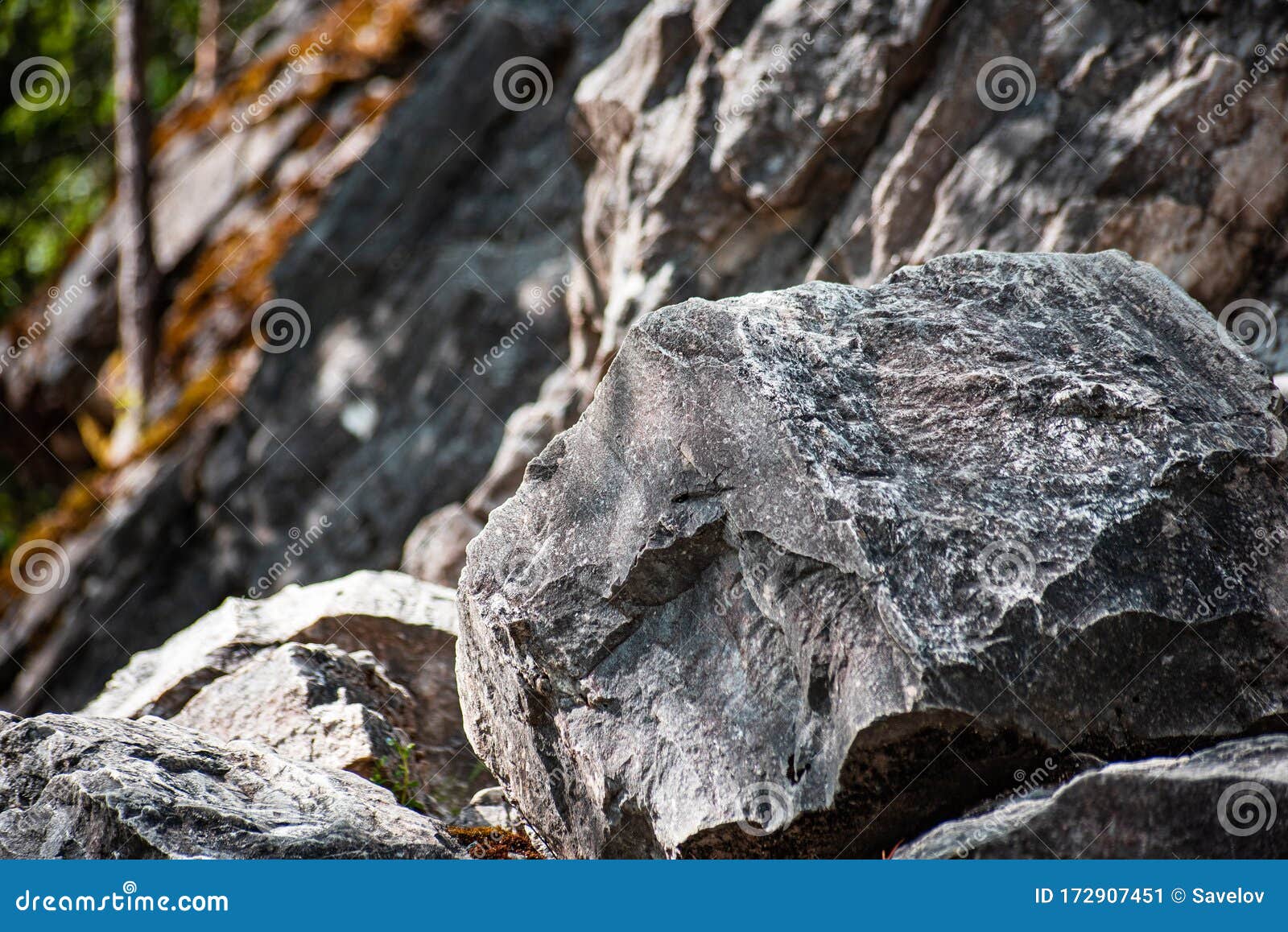 Large Marble Rough Stones on the Background Cliff Stock Image - Image ...