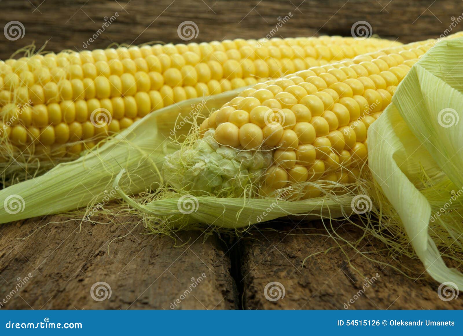 Large, Mature, Young Corn on the Wooden Background Stock Photo - Image ...