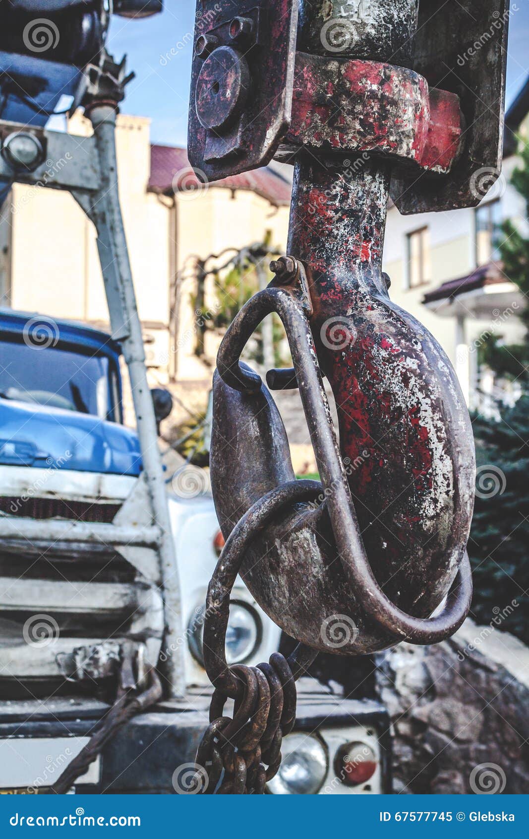 Large metal crane hook stock image. Image of blue, house - 67577745