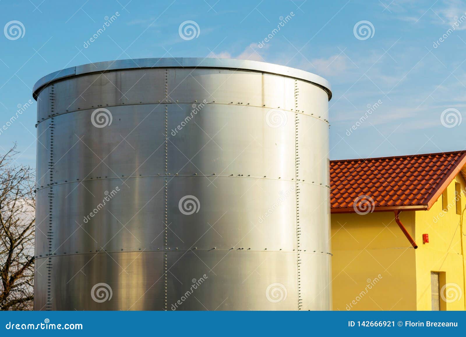 Large Metal Tank Container Installed Next To a House Stock Image ...