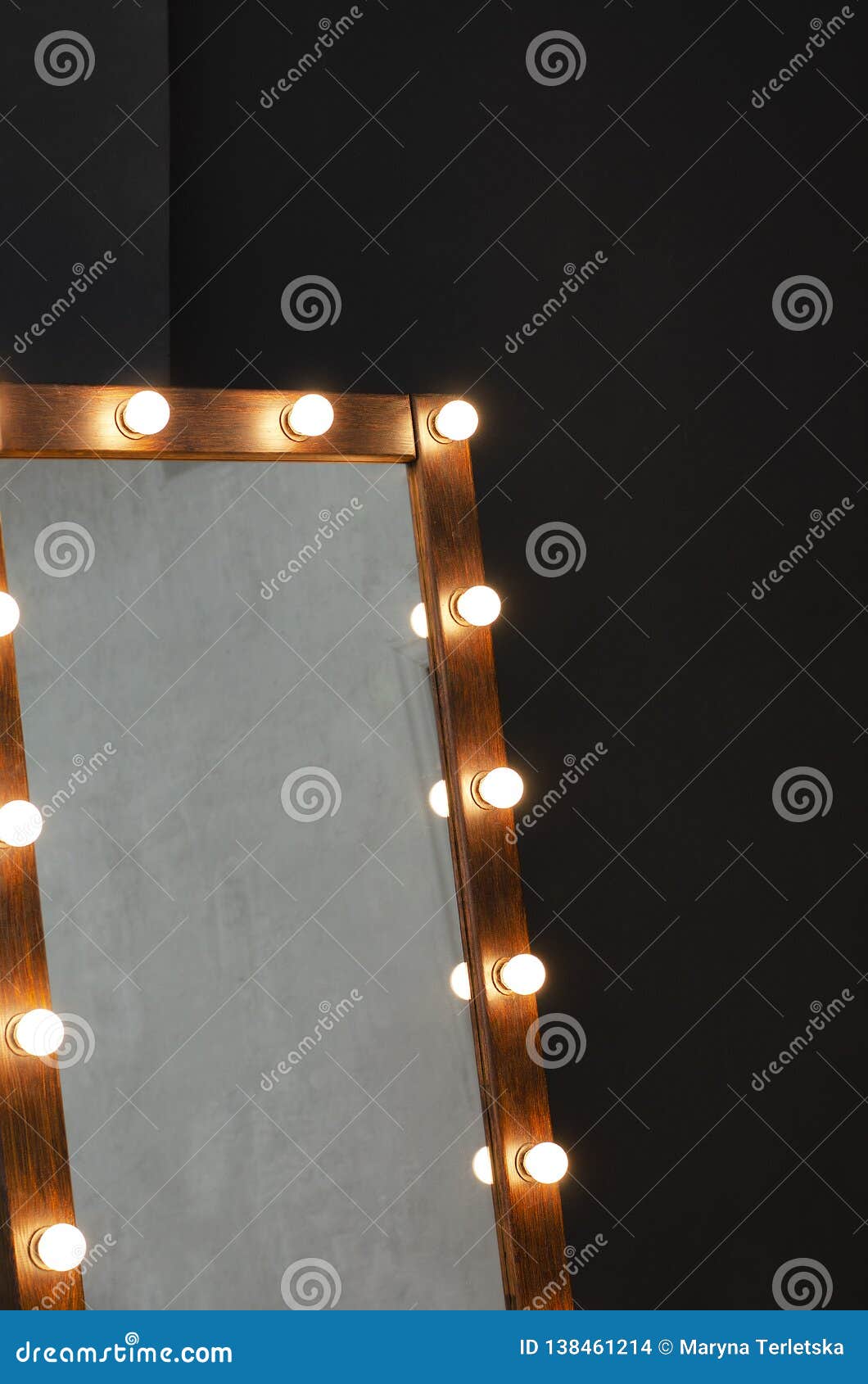 A Large Mirror with Backlight Against a Black Wall Stock Photo - Image ...