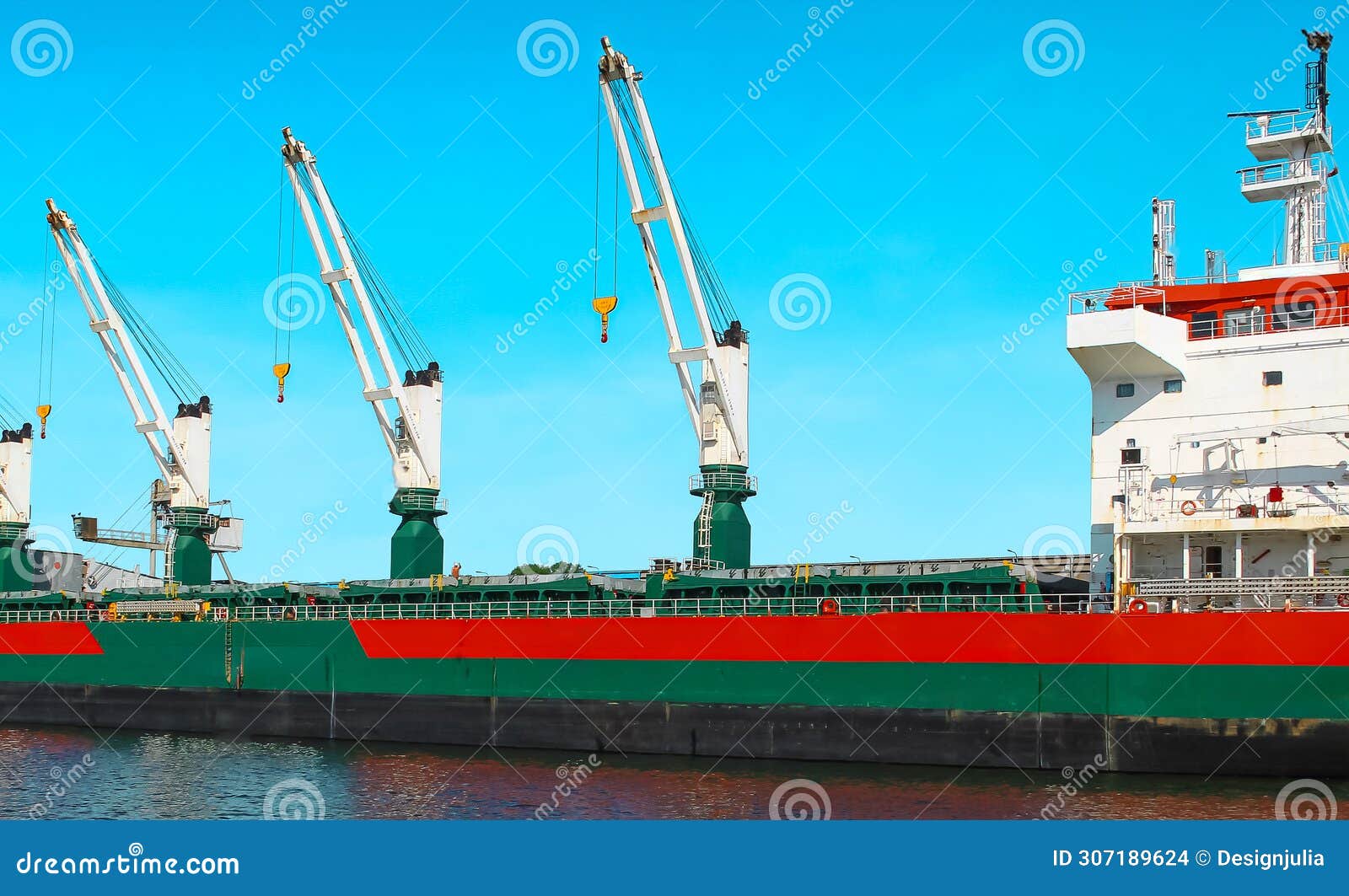 Cargo Ship at Seaport for Loading and Unloading. Green Hull with Red ...