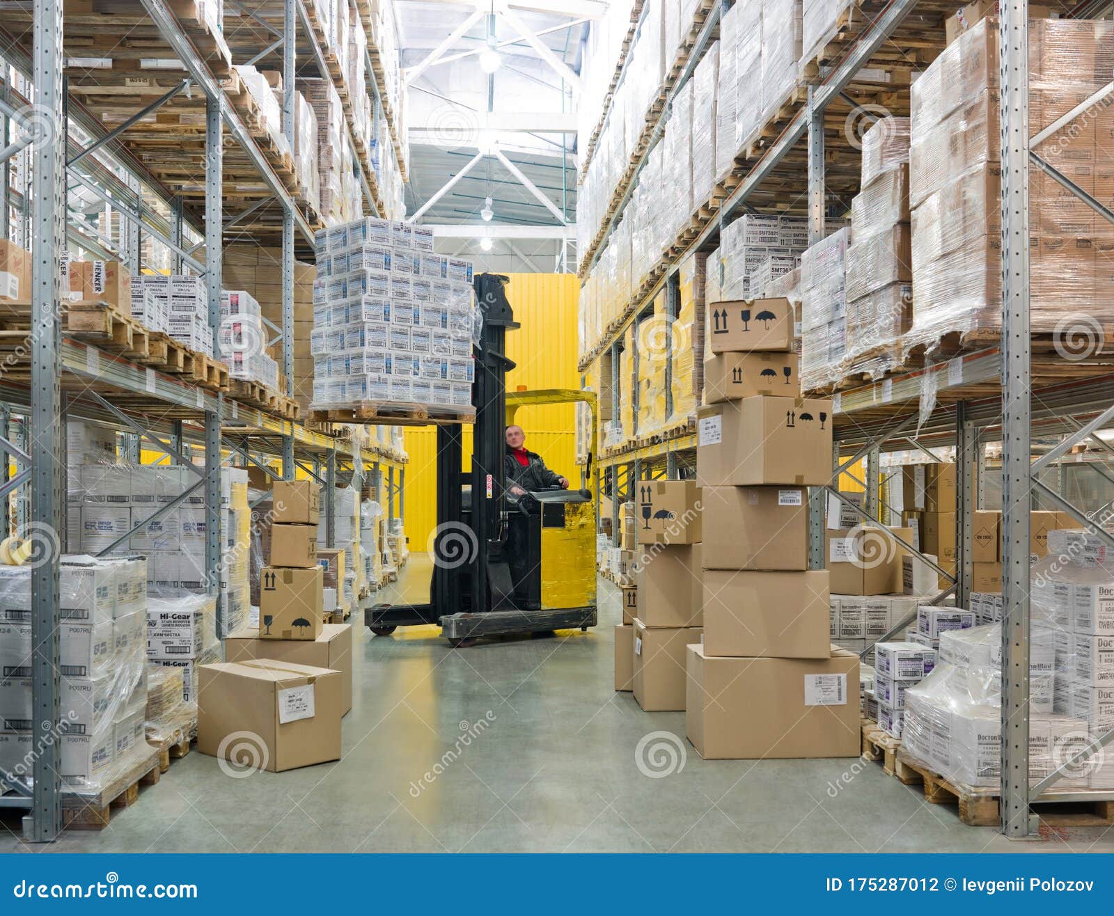 Large Modern Warehouse with Forklifts, Shelves with Pallets, Boxes ...