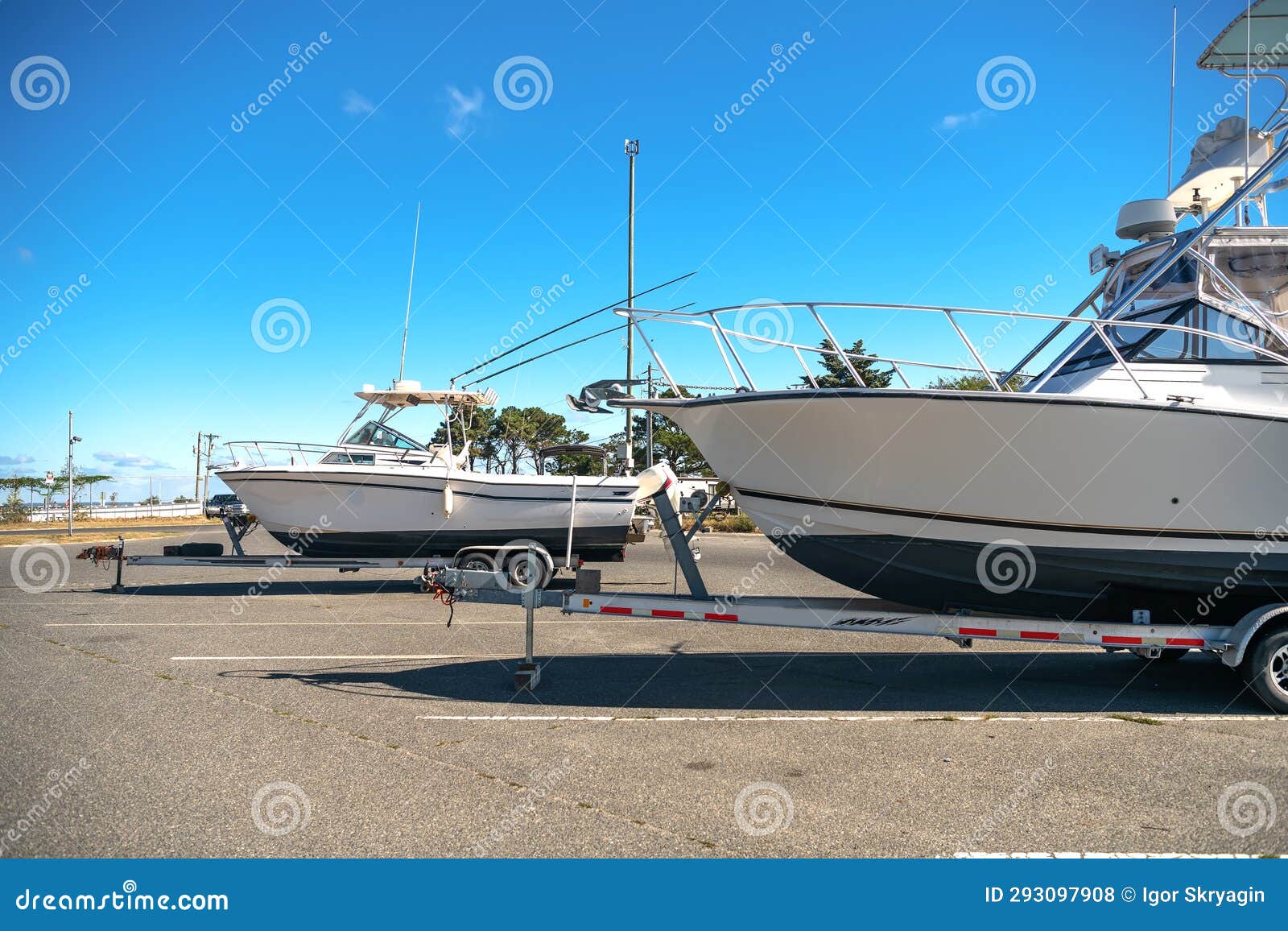 Large Motor Boats on Car Trailers Parked at the Pier Stock Photo ...