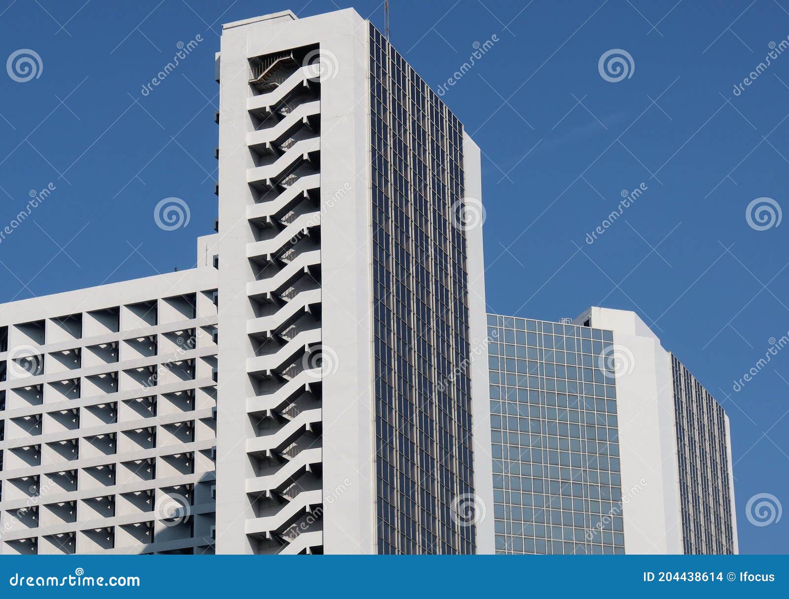Multiple-story Building Soars into Blue Sky Stock Photo - Image of ...