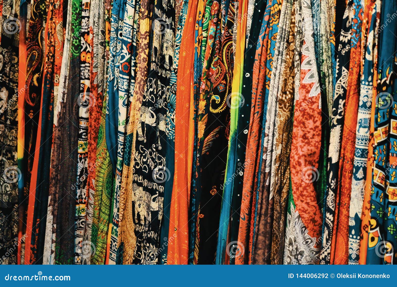 A Large Number of Colorful Shawls, Patterned Textiles, Background Stock ...