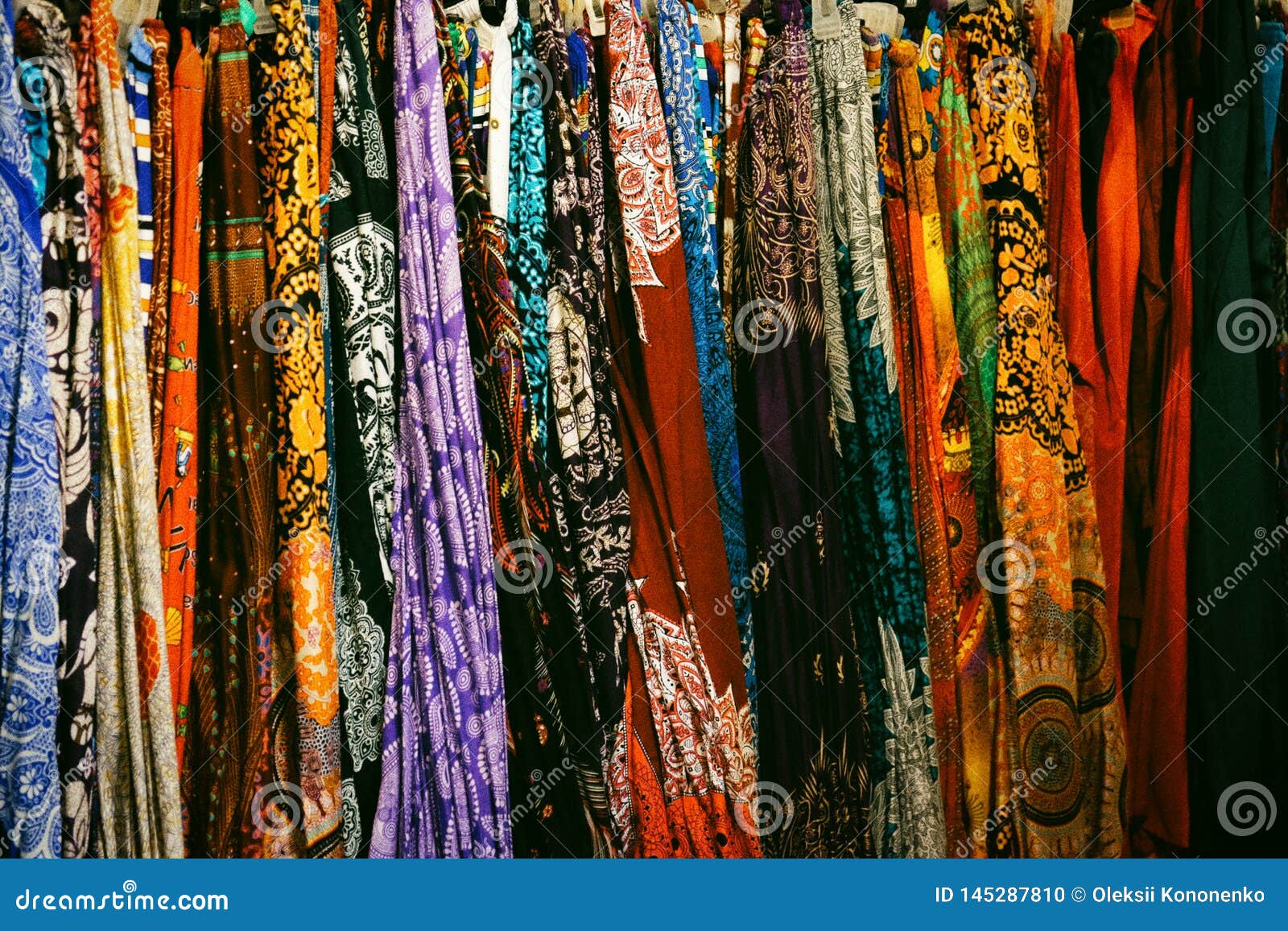 A Large Number of Colorful Shawls, Patterned Textiles, Background Stock ...