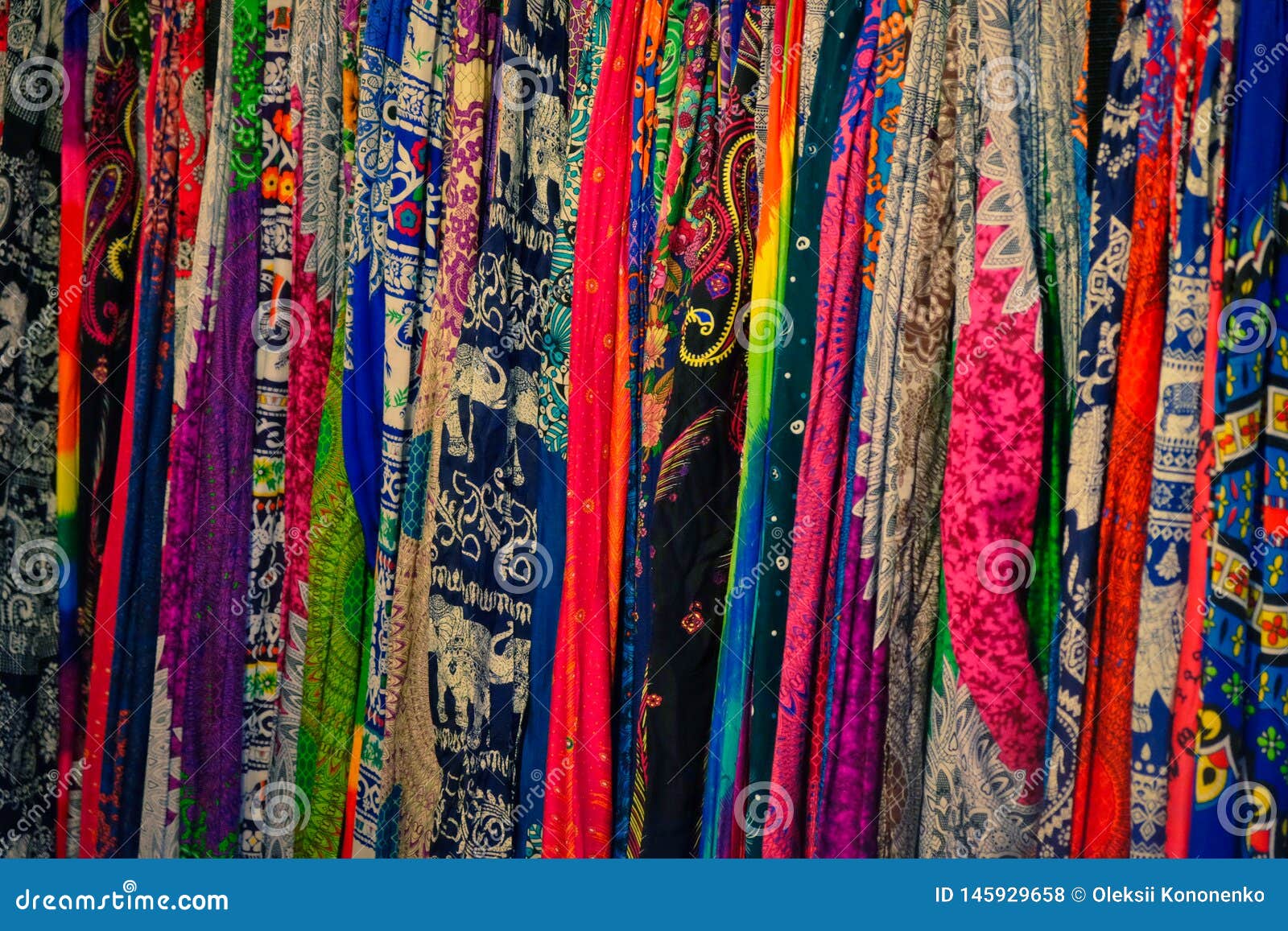 A Large Number of Colorful Shawls, Patterned Textiles, Background Stock ...