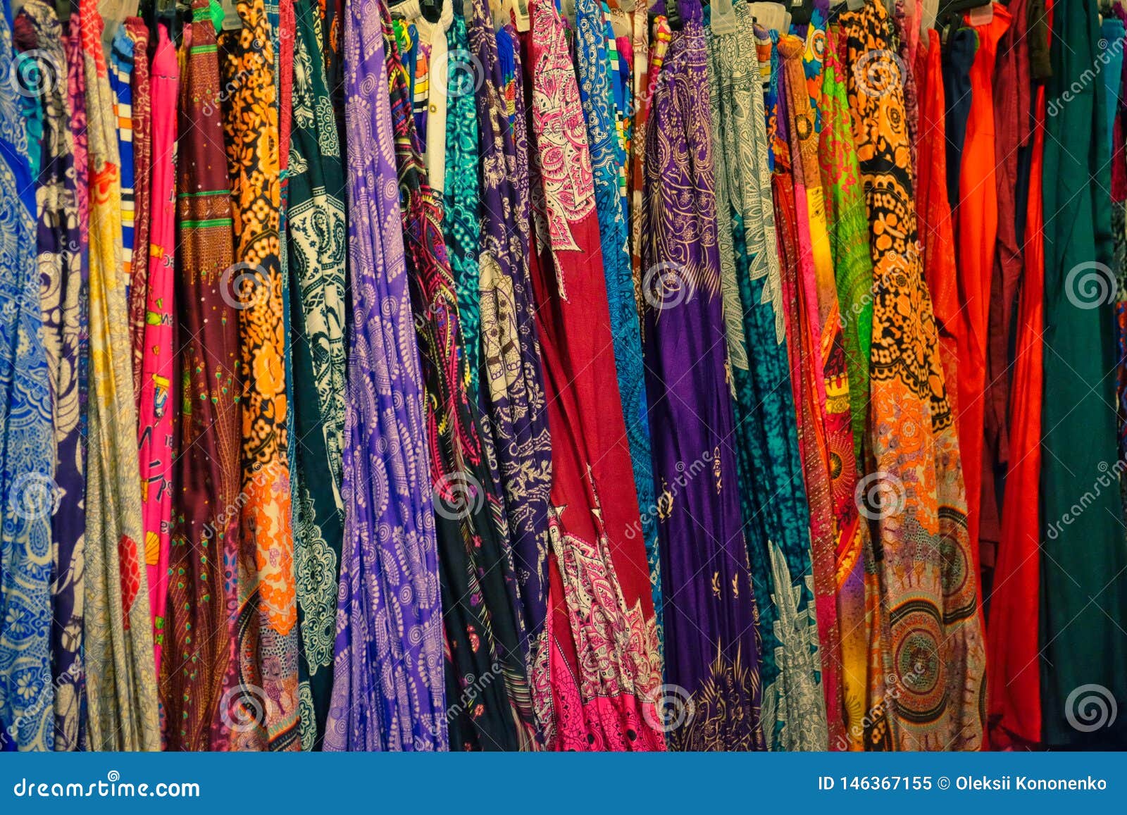 A Large Number of Colorful Shawls, Patterned Textiles, Background Stock ...