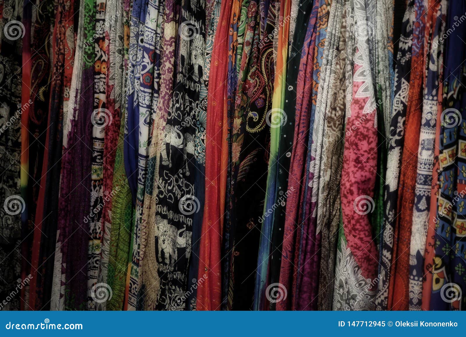 A Large Number of Colorful Shawls, Patterned Textiles, Background Stock ...