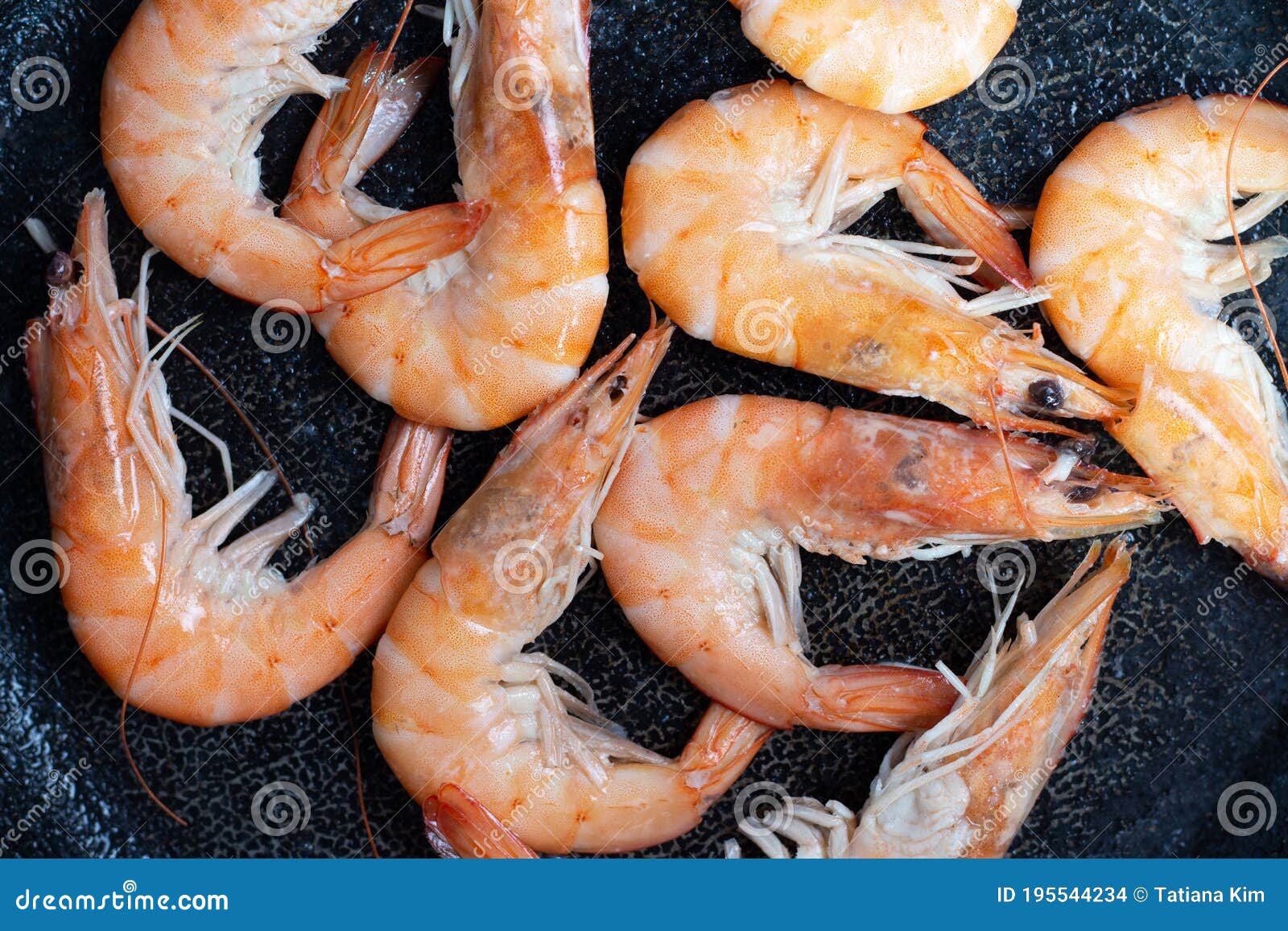 A Large Number of Orange Prawns on Black Background, a View from Above ...