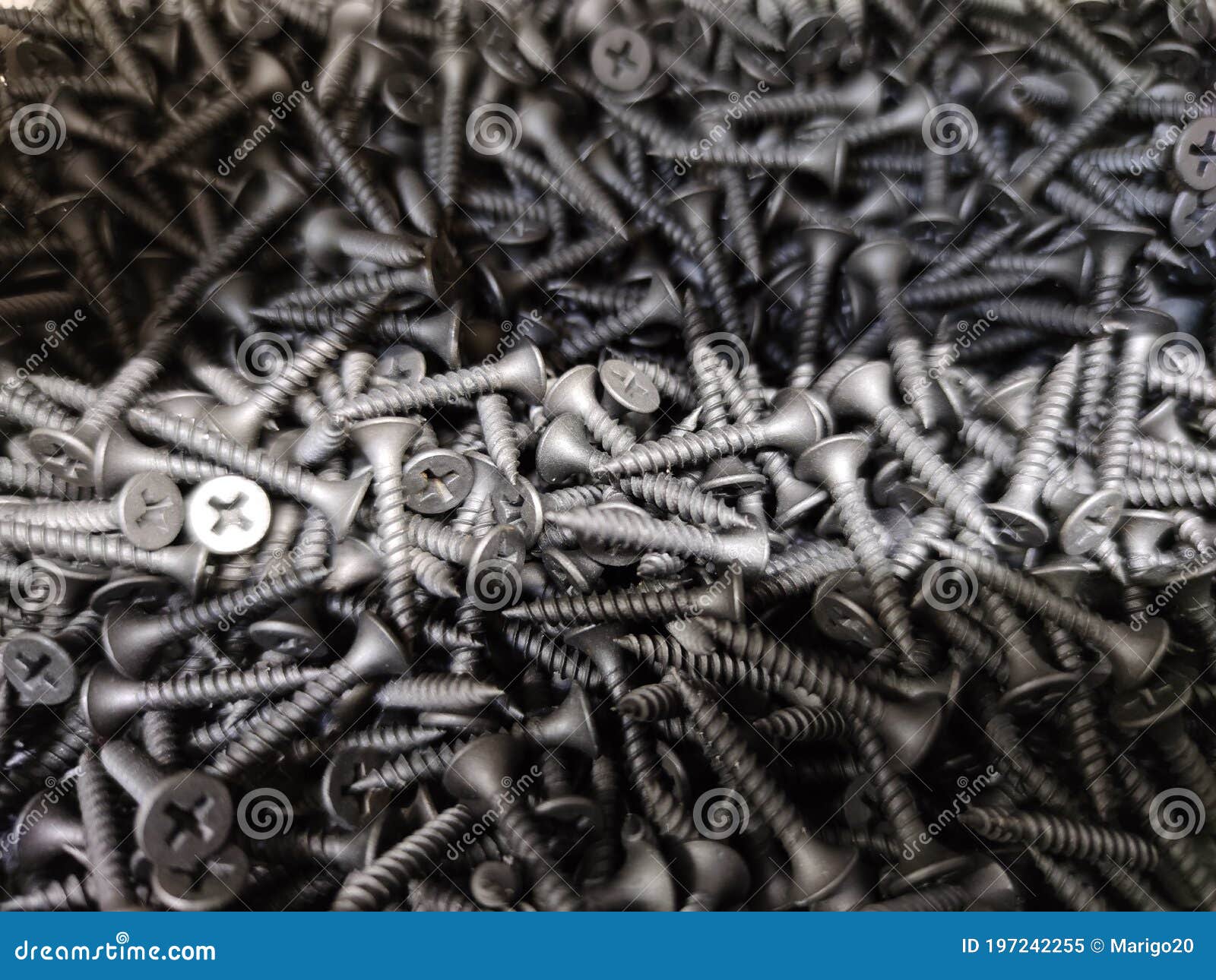 A Large Number of Silver Chrome-plated Identical Screws Stock Image ...