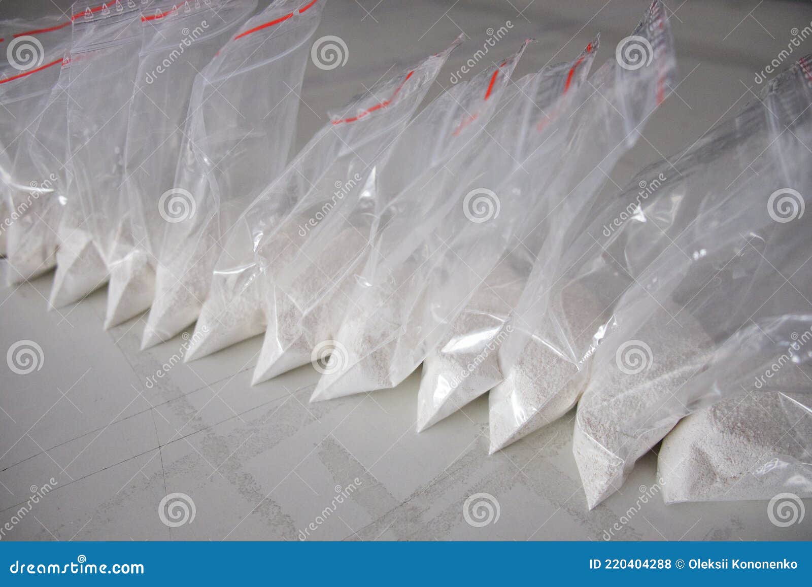 A Large Number of Transparent Sachets Filled with White Powder. White ...