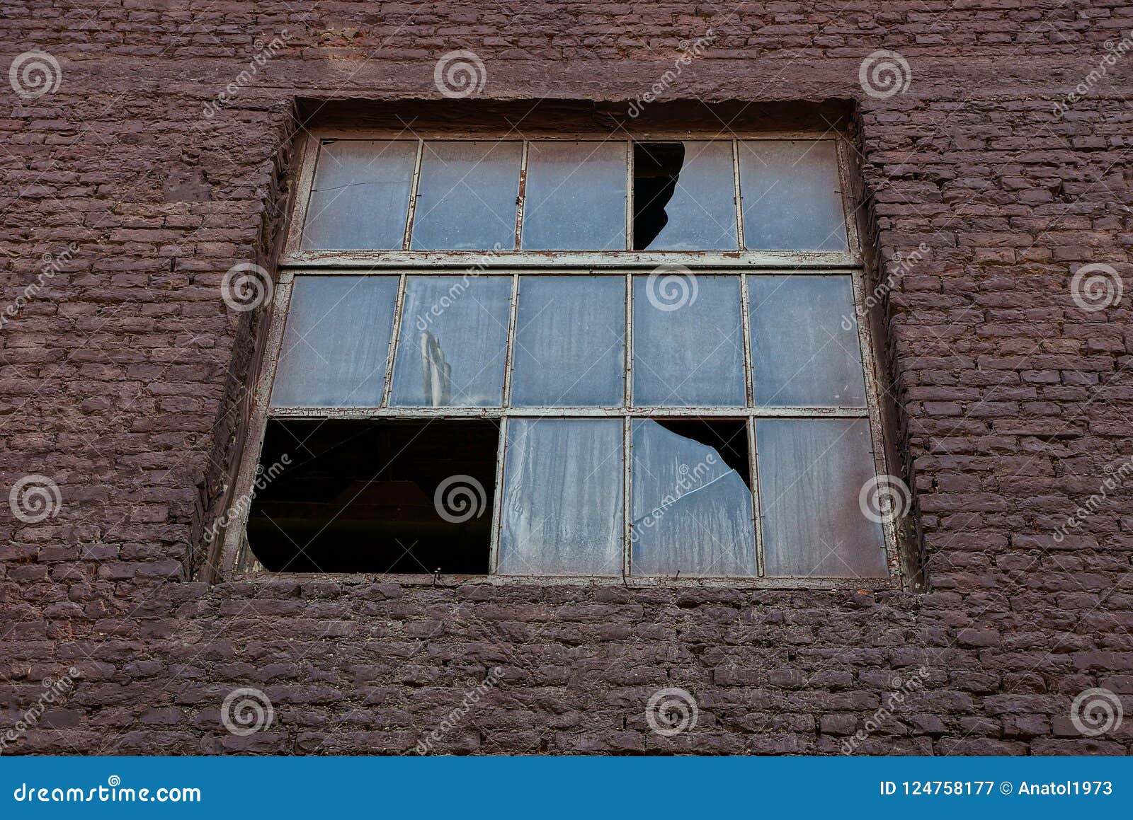 A Large Old Broken Window on a Brown Brick Wall Stock Image - Image of ...