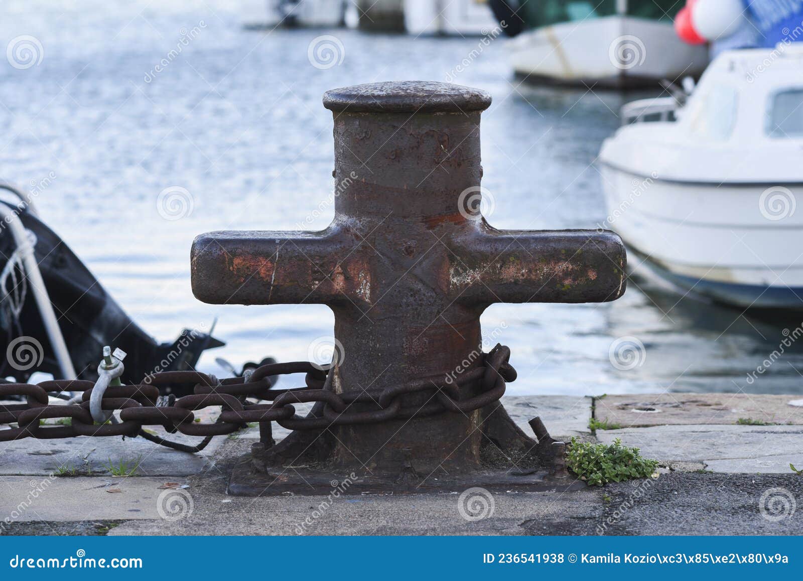 Large Old Rusty Boat Mooring Poles in the Harbor Stock Photo - Image of ...
