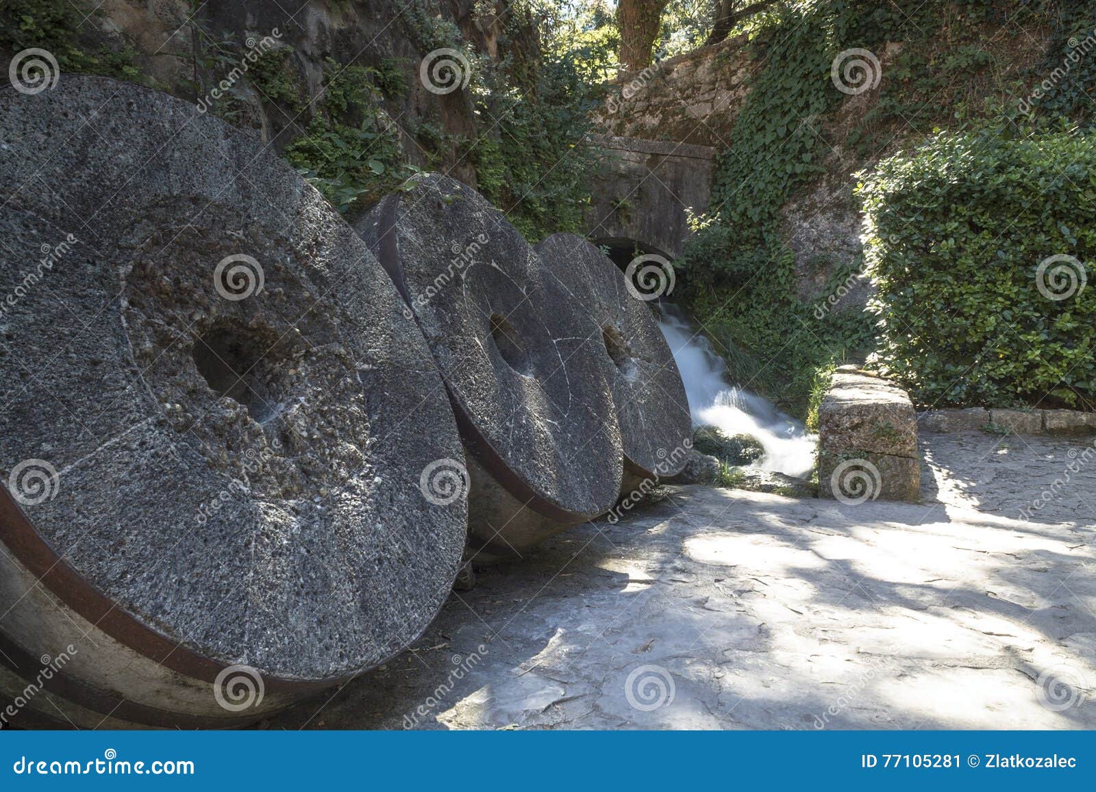 Large old stone wheel stock image. Image of small, house - 77105281