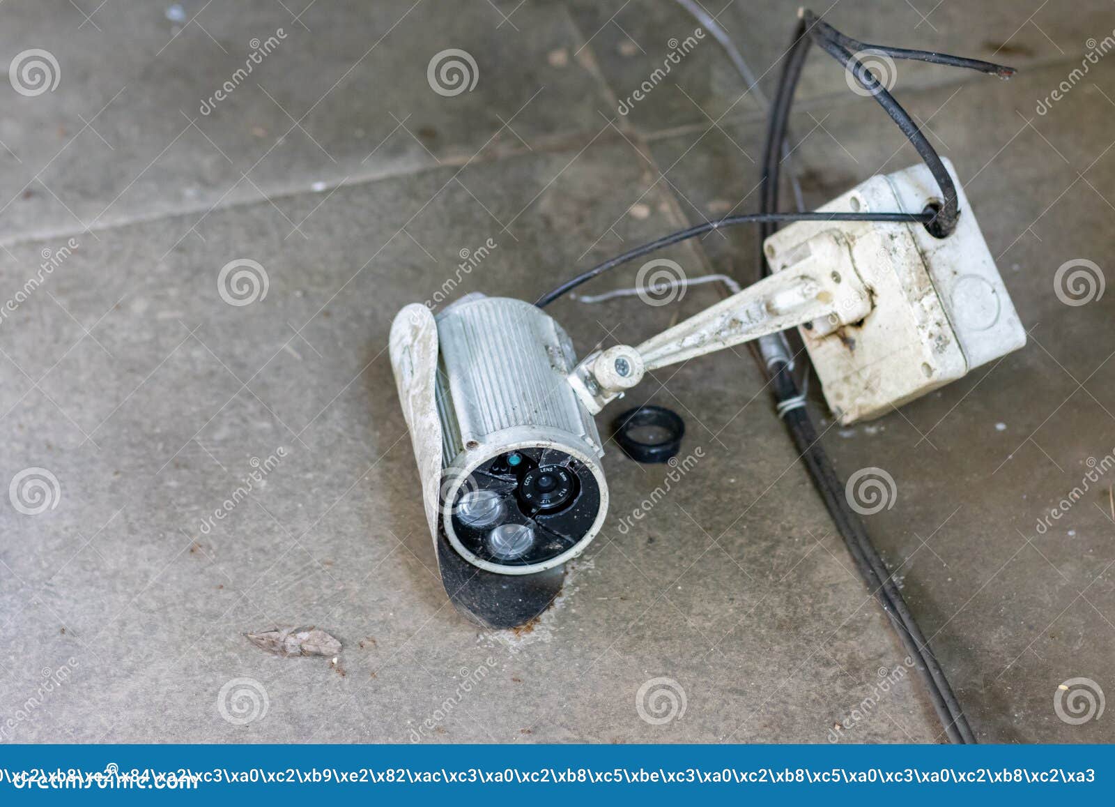 A Large Old White CCTV Camera Fell To the Ground, the Camera Was Broken ...