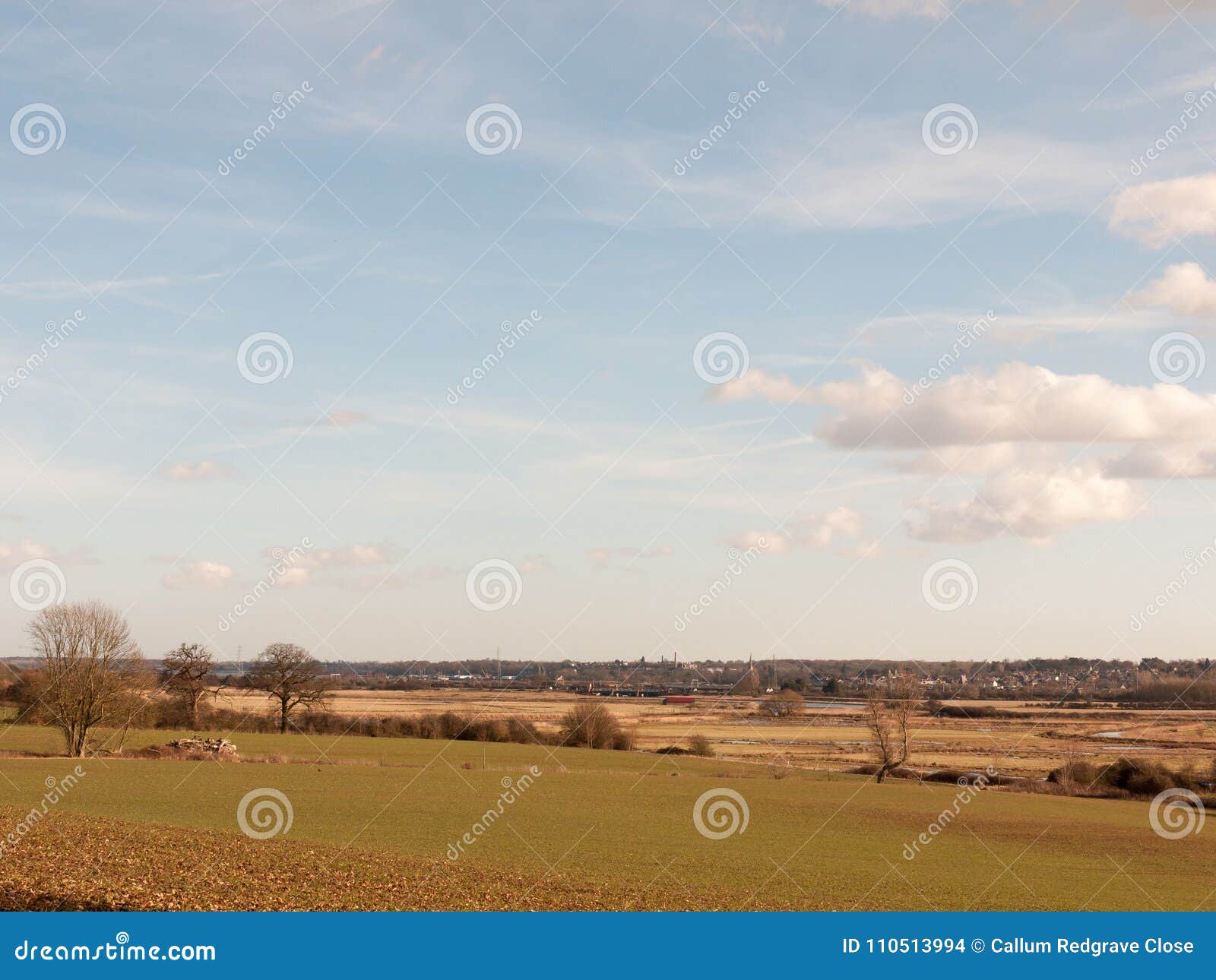 Large Open Grass Plain Field with Blue Cloudy Sky Background Nature ...