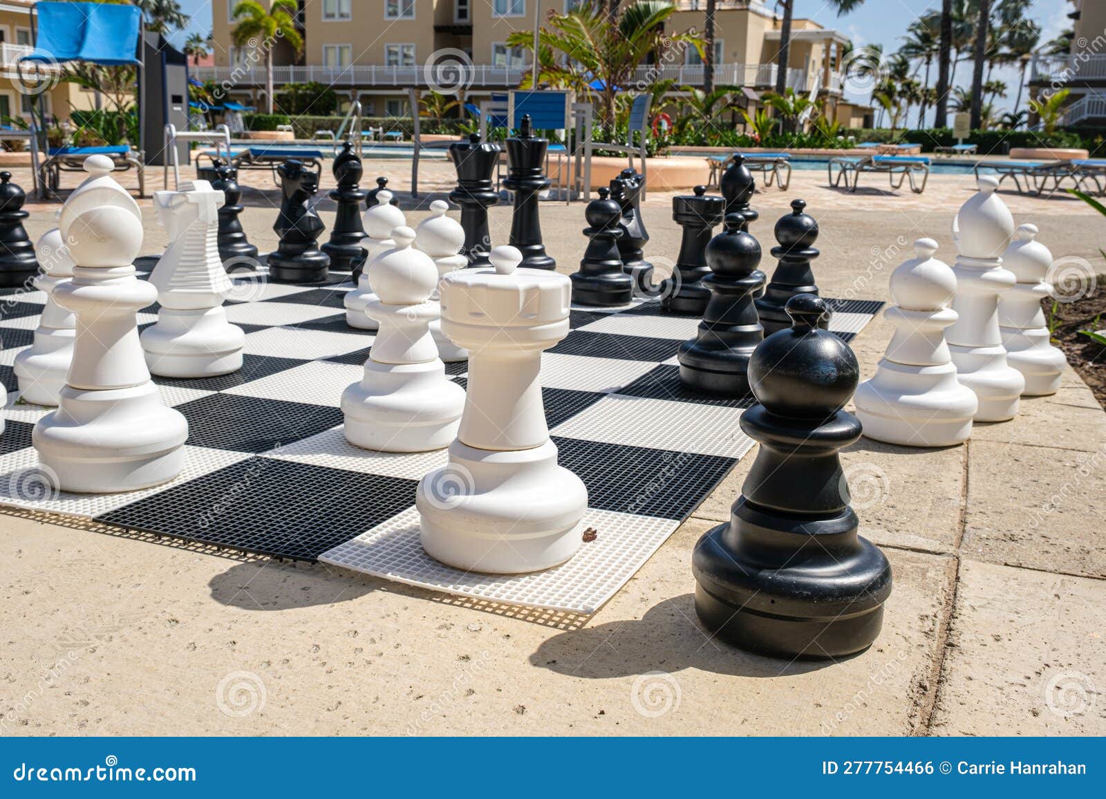 Large Outdoor Chess Set at a Resort Poolside on a Sunny Day Editorial ...