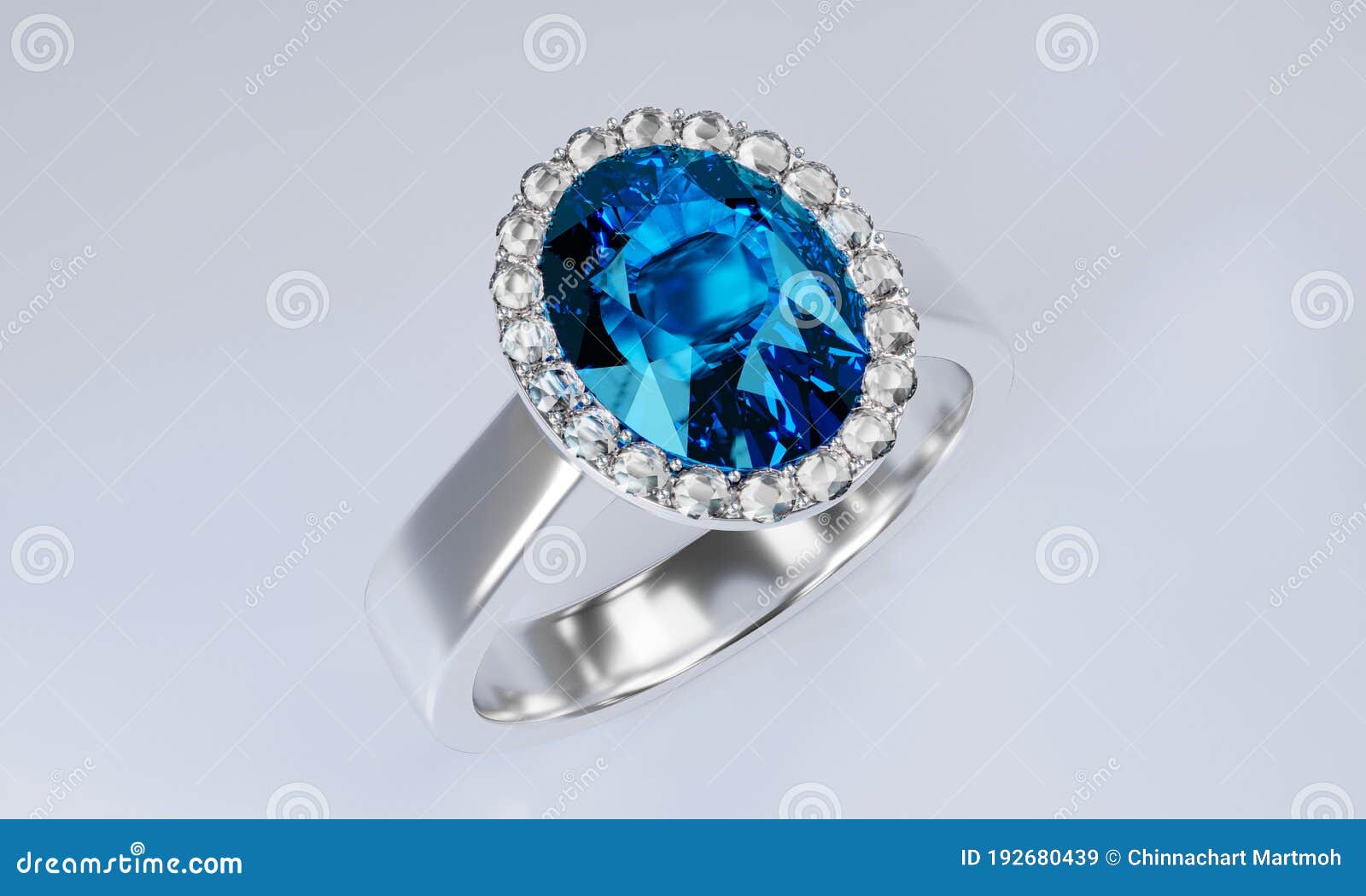 The Large Oval Blue Diamond is Surrounded by Many Diamonds on the Ring ...