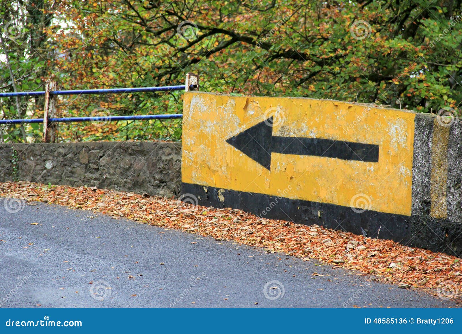 Large Painted Arrow on Sharp Curve of Bridge Stock Photo - Image of ...