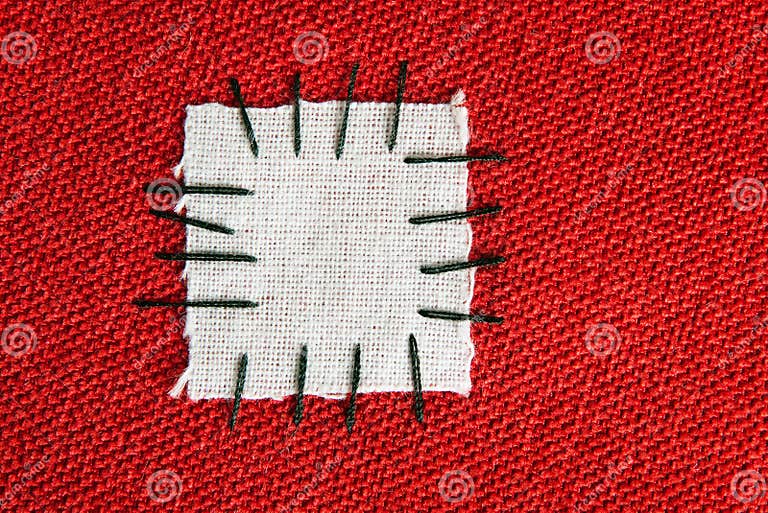 Large patch on red cloth stock photo. Image of cotton - 17756424