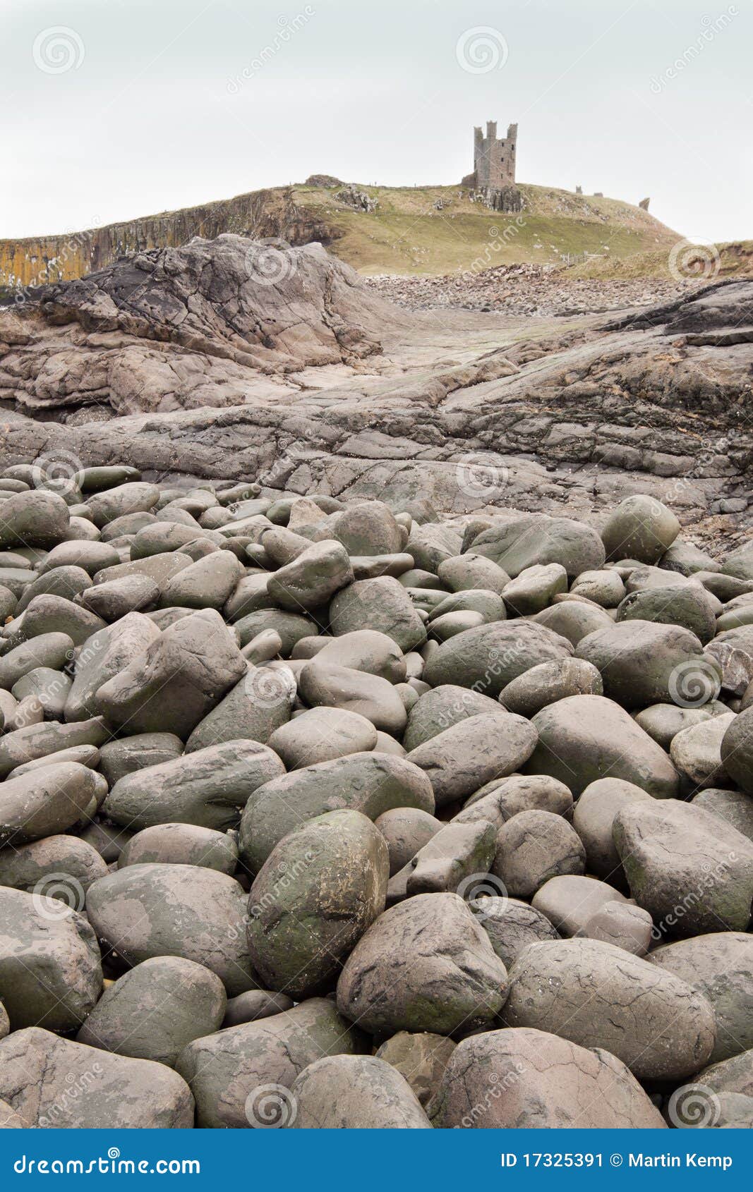 Large Pebbles at Dunstanburgh Stock Image - Image of grass, ruin: 17325391