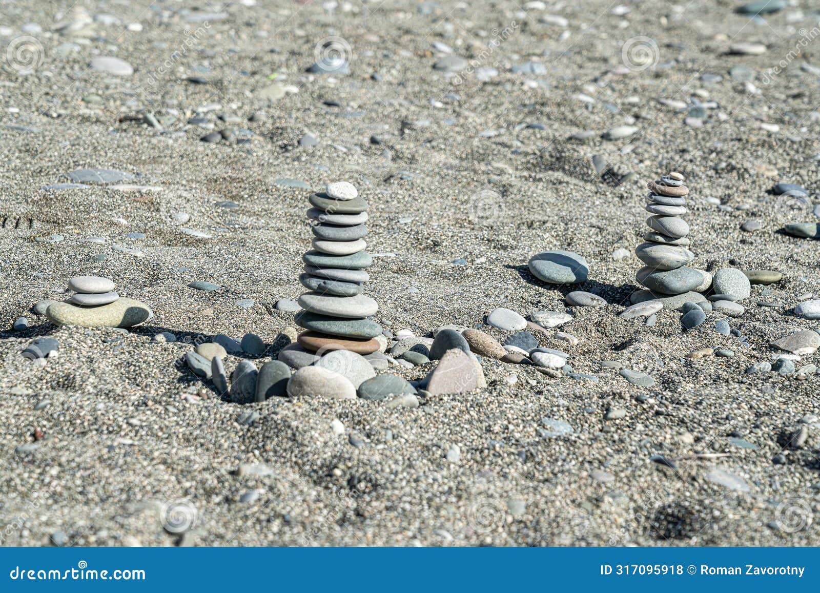 Large Pebbles Stacked on the Sand of the Beach Stock Photo - Image of ...