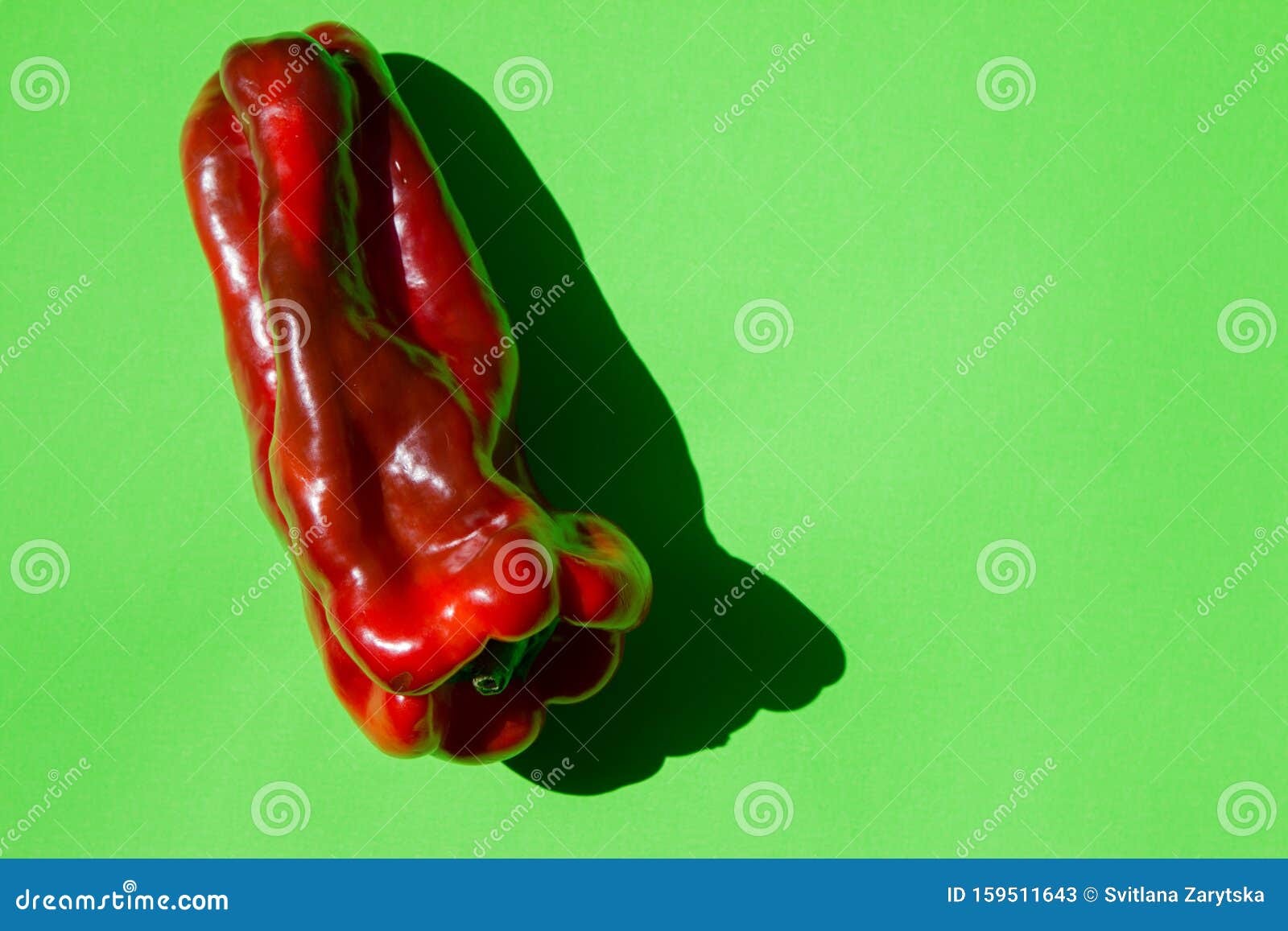 Large Pepper with Shadow on a Green Background Stock Image - Image of ...