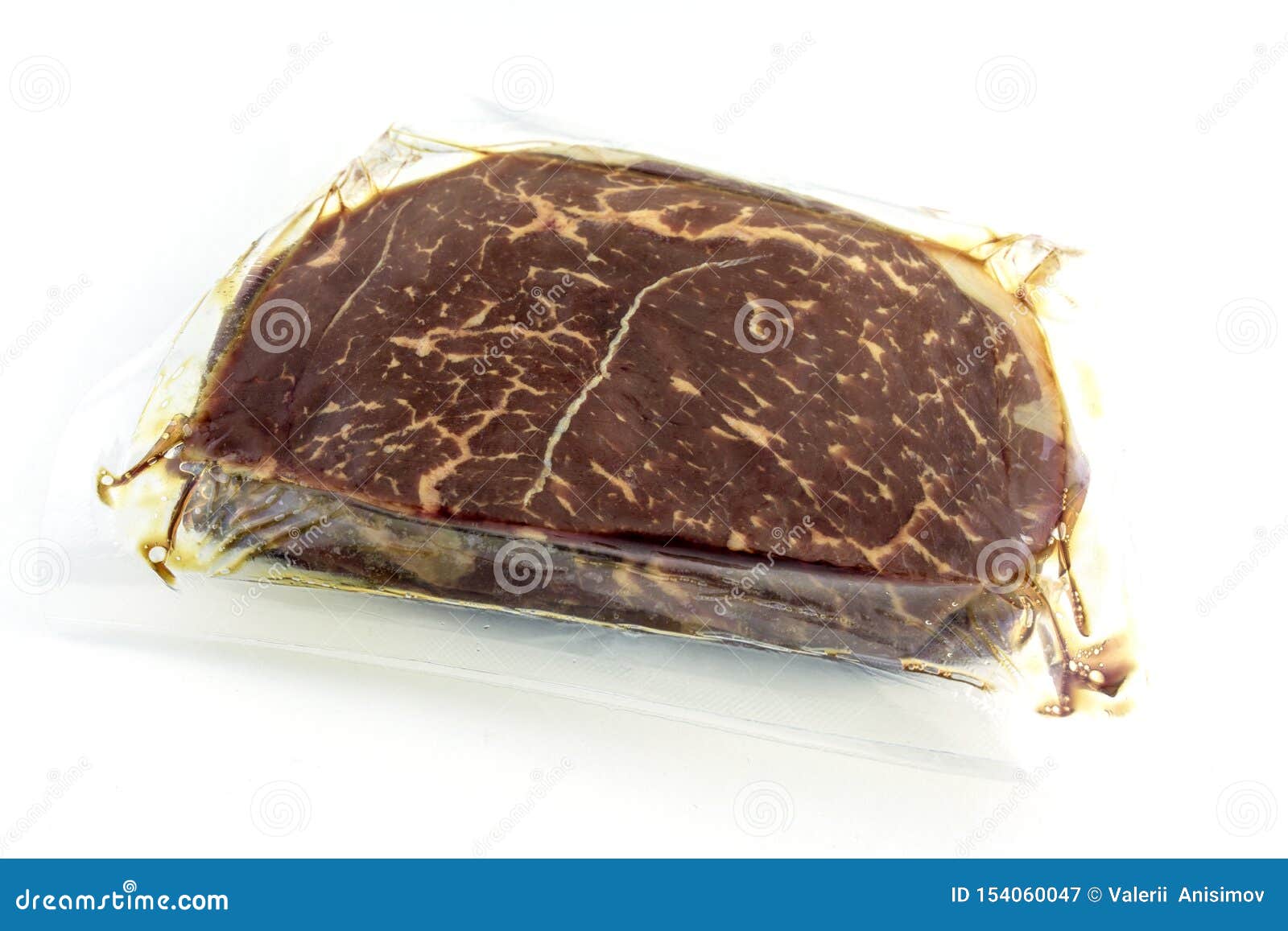 A Large Piece of Beef, Steak Packed in Vacuum Packaging on a White ...