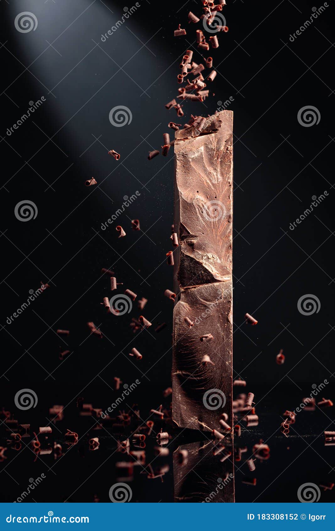 Large Piece of Dark Chocolate and Falling Chocolate Crumbs Stock Photo ...