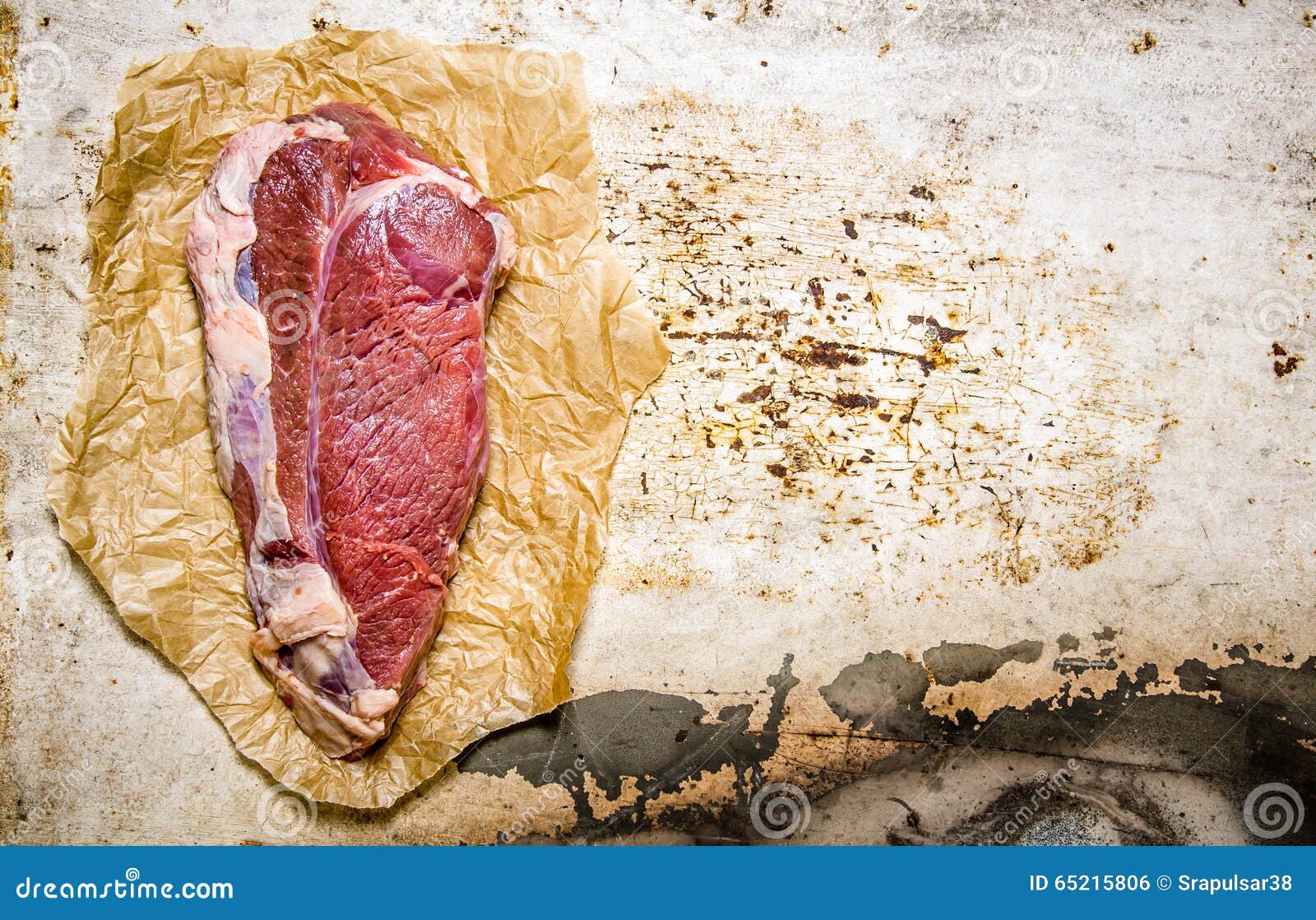 A Large Piece of Raw Fresh Meat on Paper. Stock Photo - Image of ...