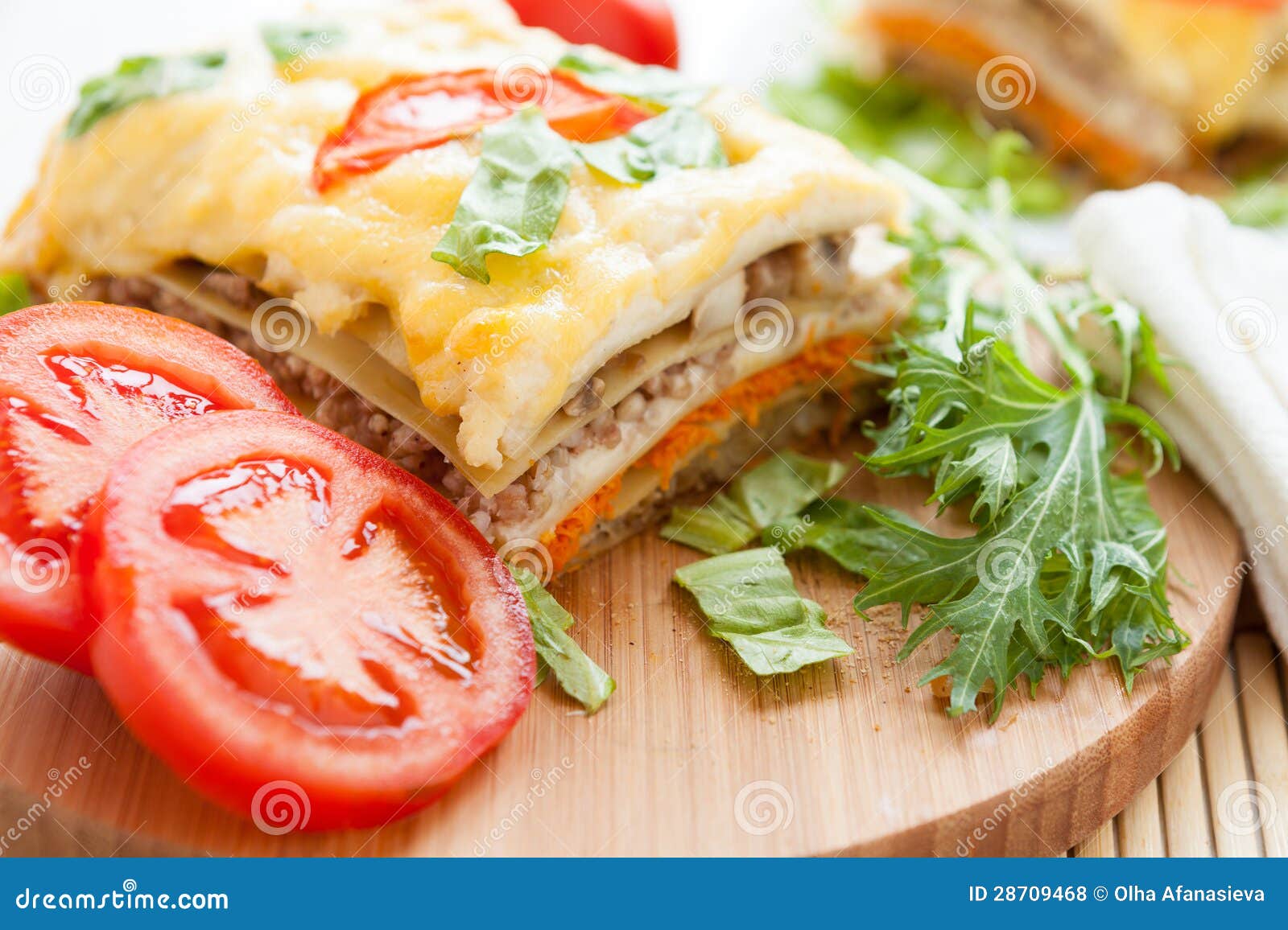 Large Piece of Vegetable Lasagna on a Wooden Surface Stock Photo ...