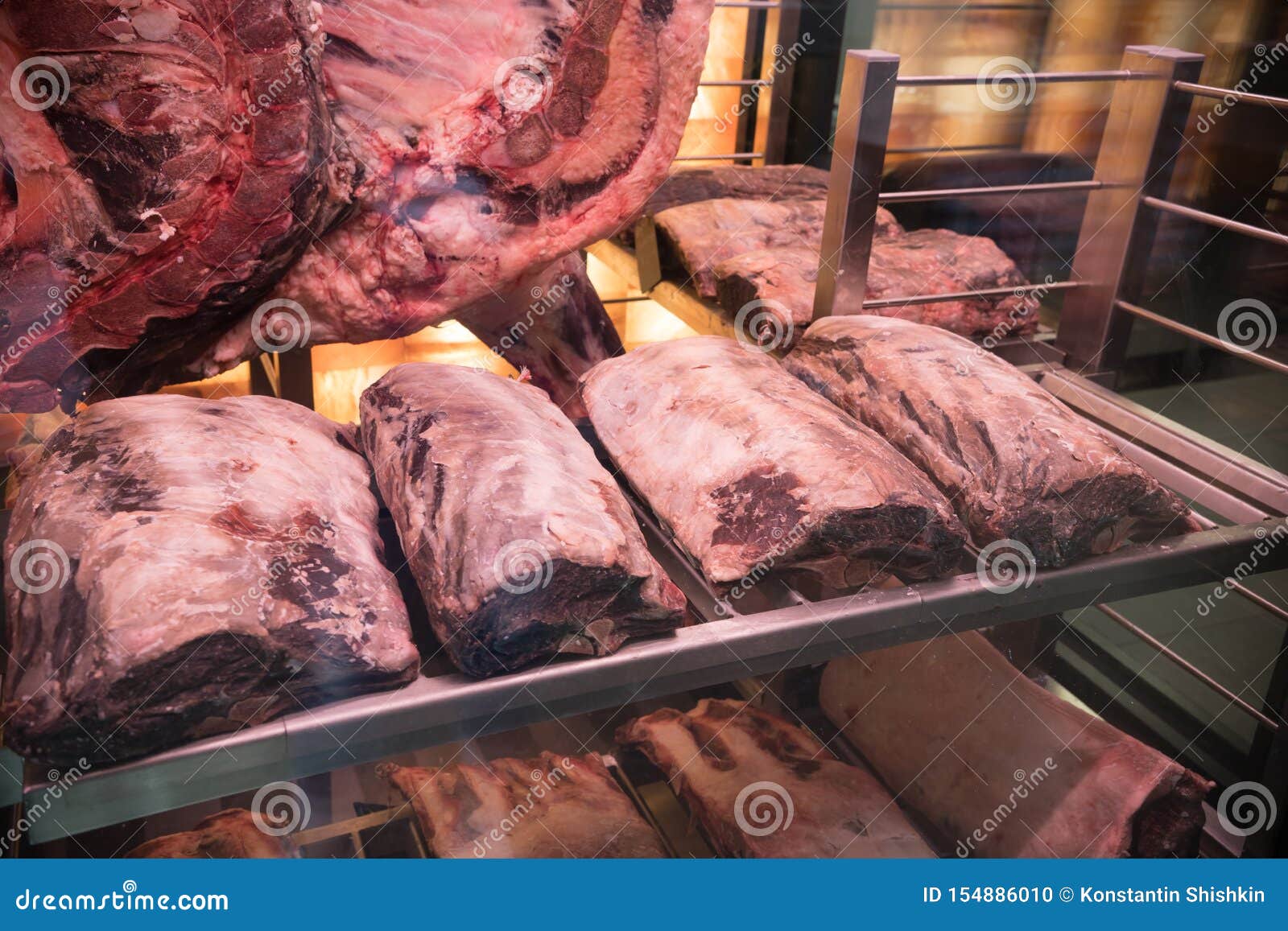 Large Pieces of Beef at the Display Window Stock Photo - Image of ...