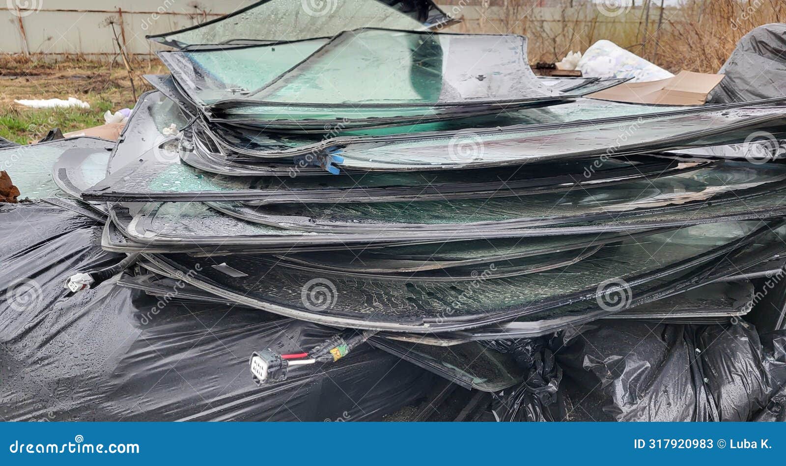 A Large Pile of Broken Auto Glass in a Garbage Dump. Stock Image ...