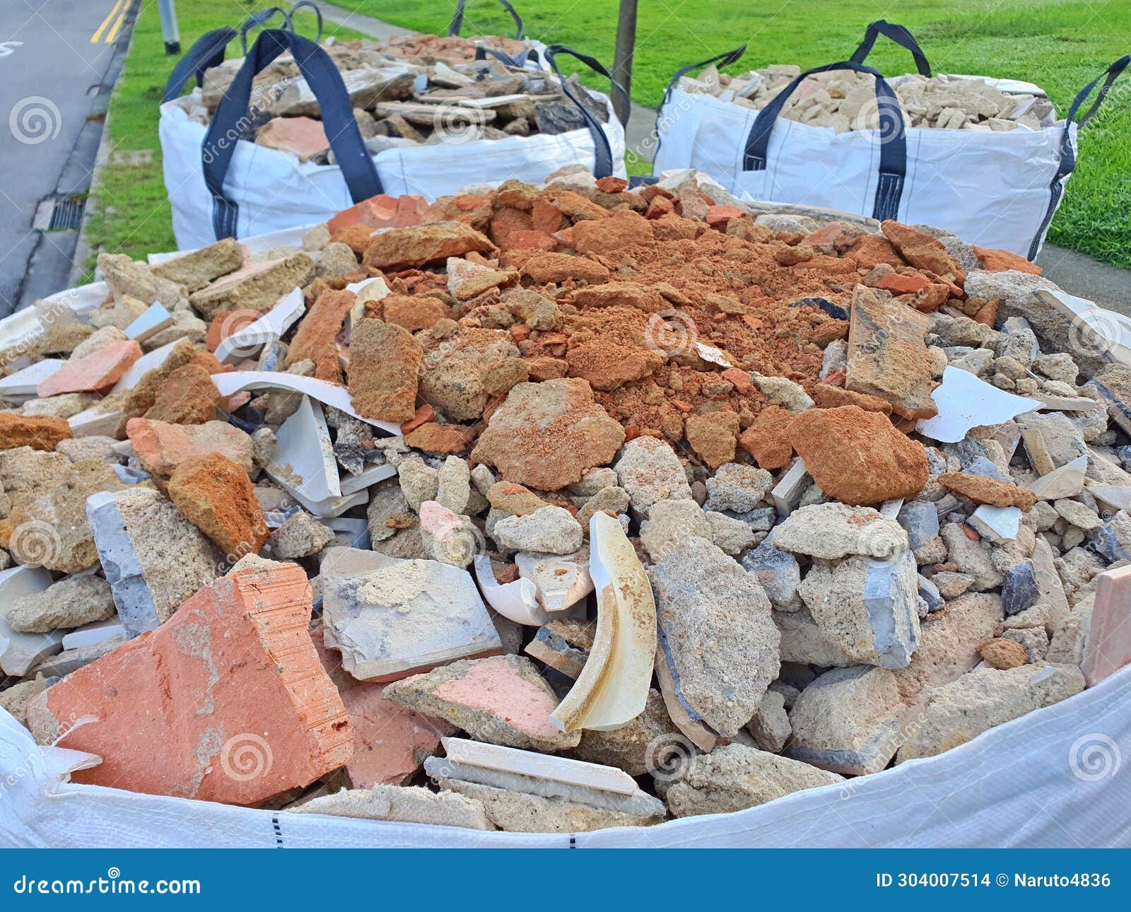 Large Pile of Construction Waste in Debris Bags Stock Photo - Image of ...