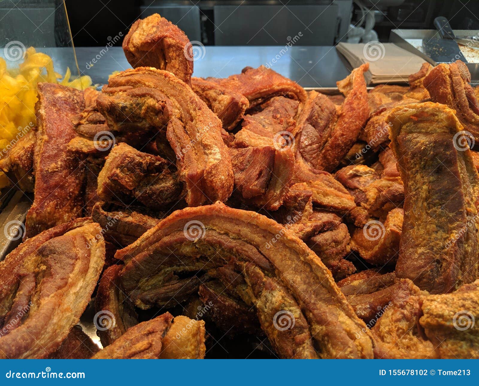 A large pile of pork rinds stock photo. Image of pork - 155678102