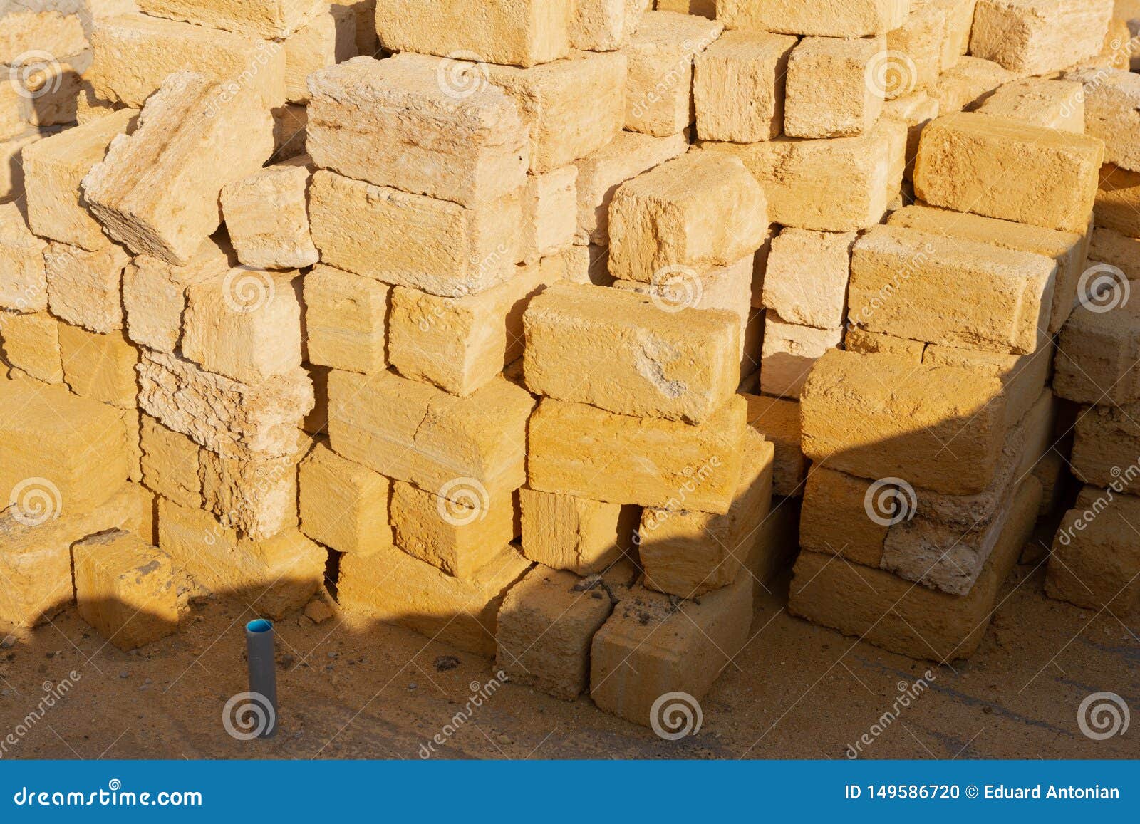 Large Pile of Shell Bricks, Building a House from an Environmentally ...