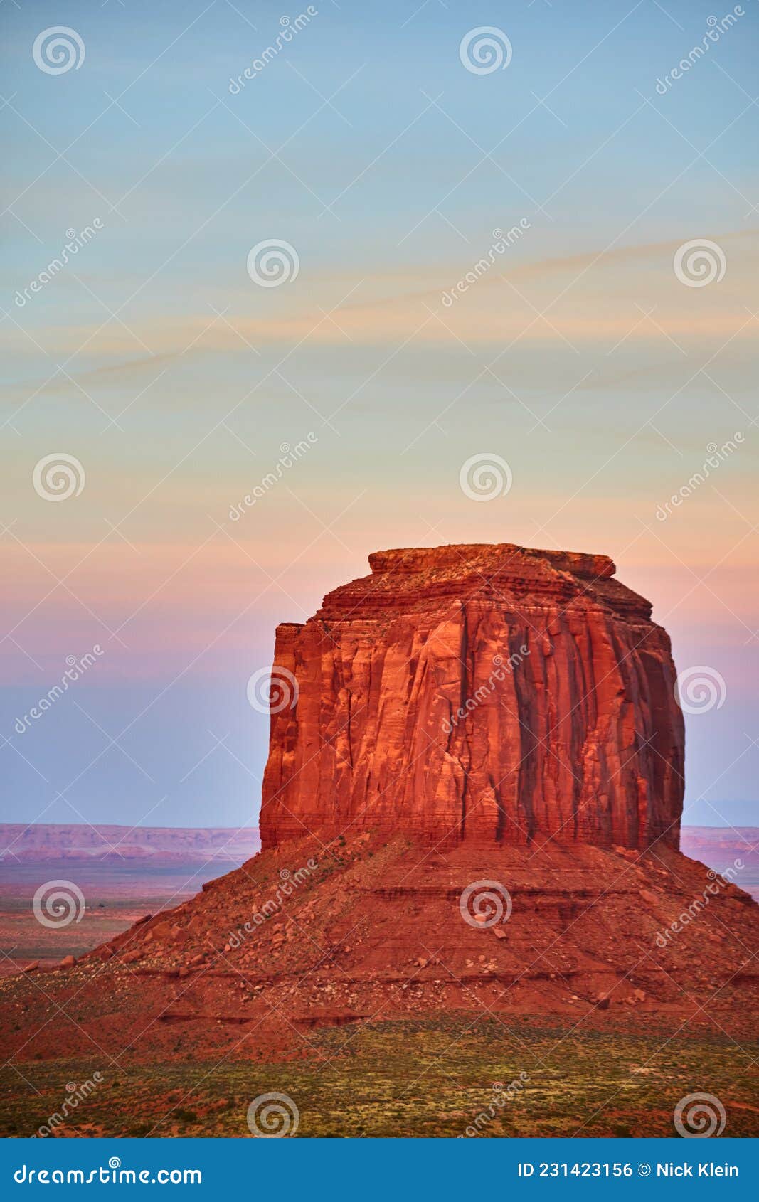Large Pillar of Red Rock Vertical in Desert Sunset, Monument Valley ...