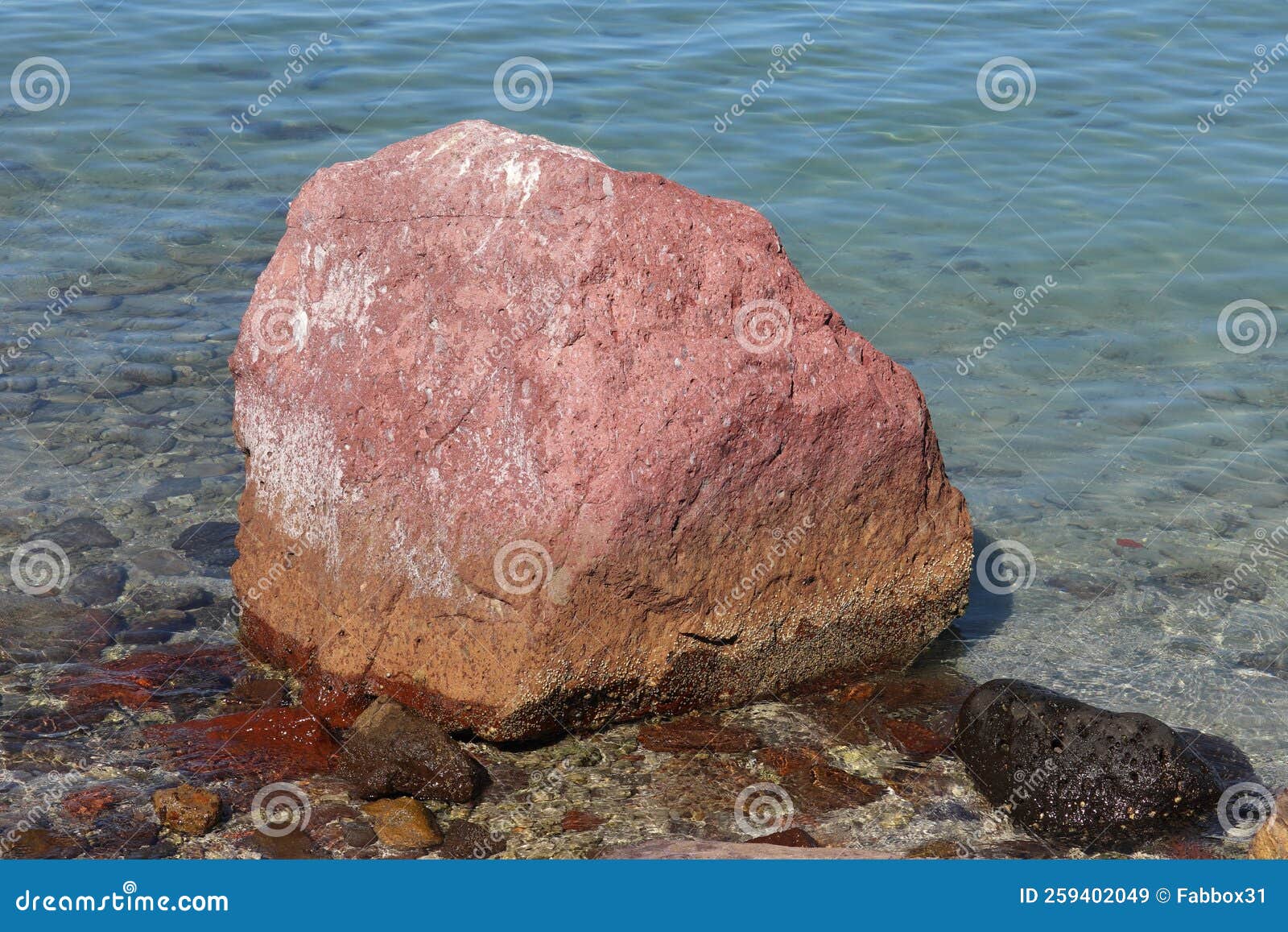 A Large Pink Rock by the Beach. Stock Image - Image of nature, water ...
