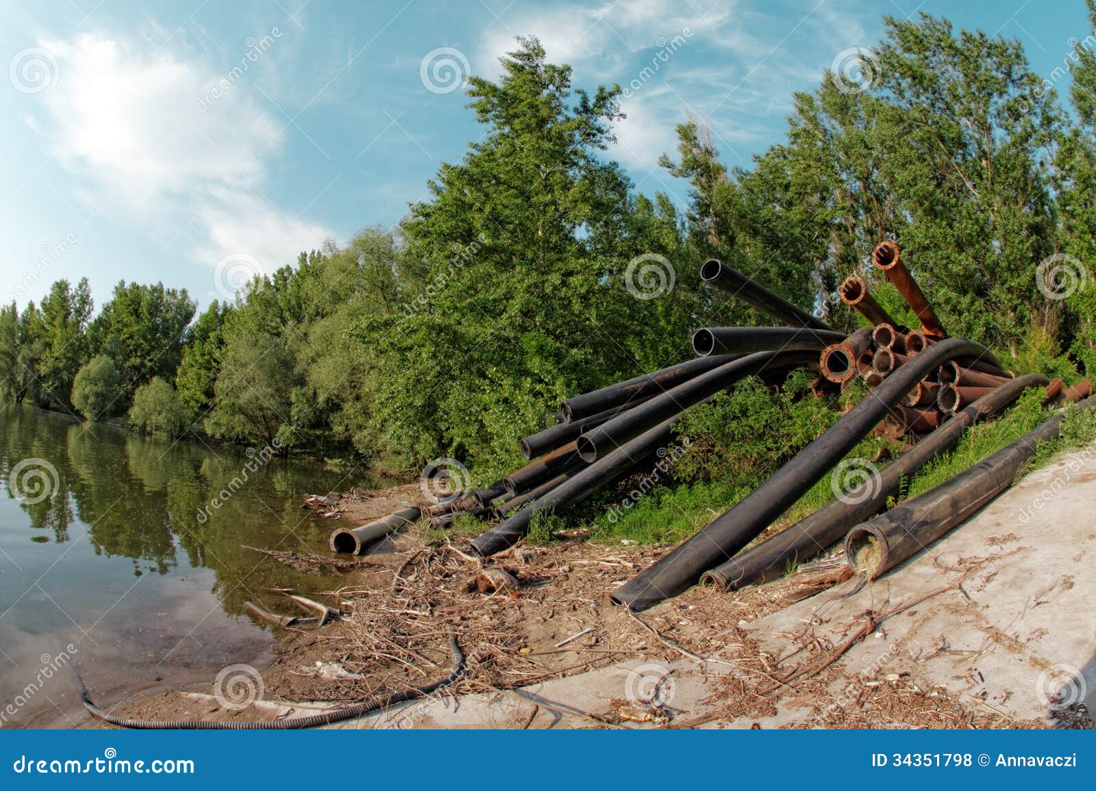 Large Pipes Running into the Lake Stock Photo - Image of pile, lake ...