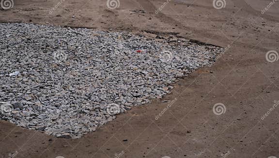 Large Pit in Asphalt Road Covered with Rubble. Concept of Problem Roads ...