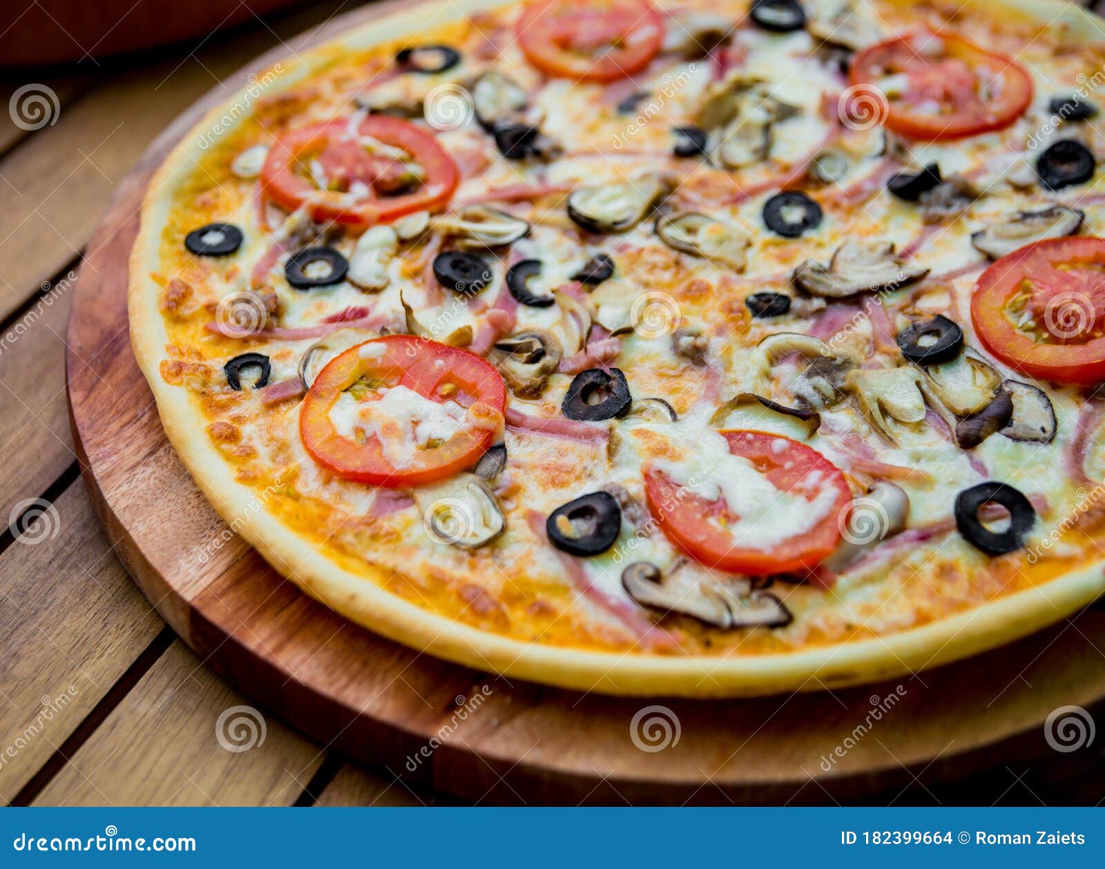 Large Pizza on a Wooden Table. Restaurant. Stock Photo - Image of ...