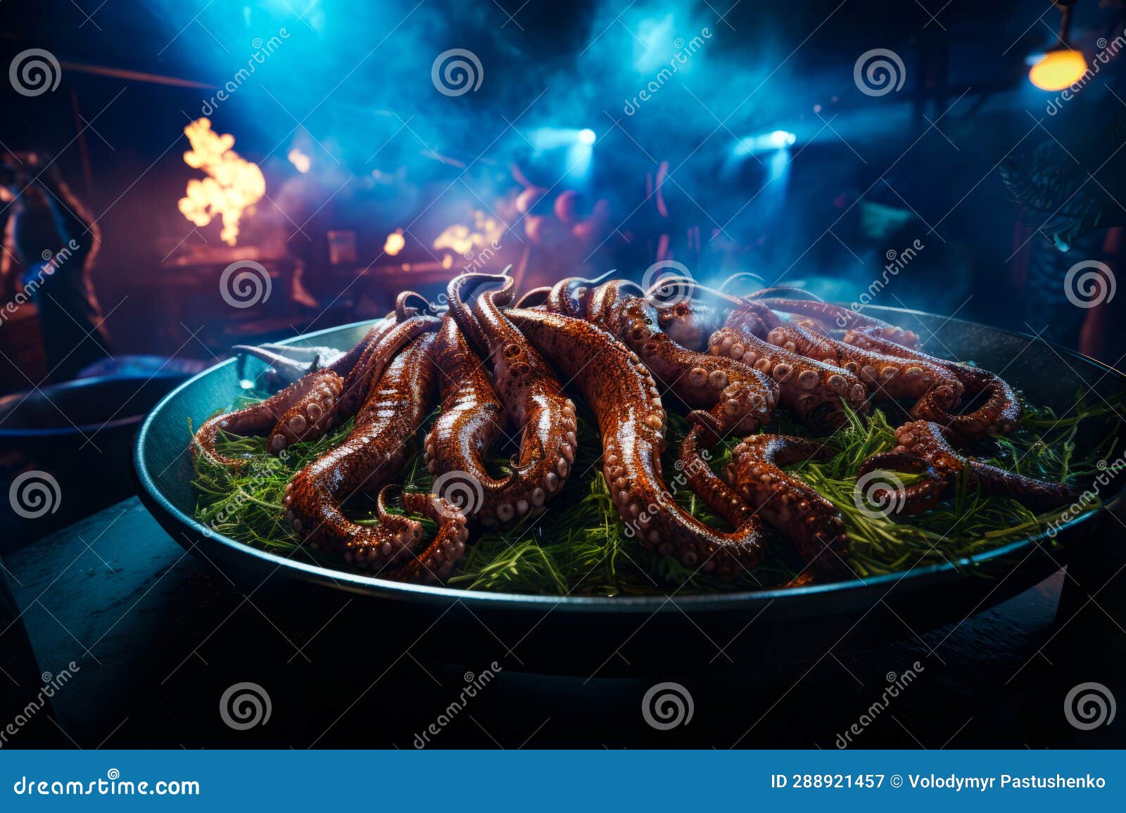 Large Platter of Octopus on Table with Fire in the Background ...