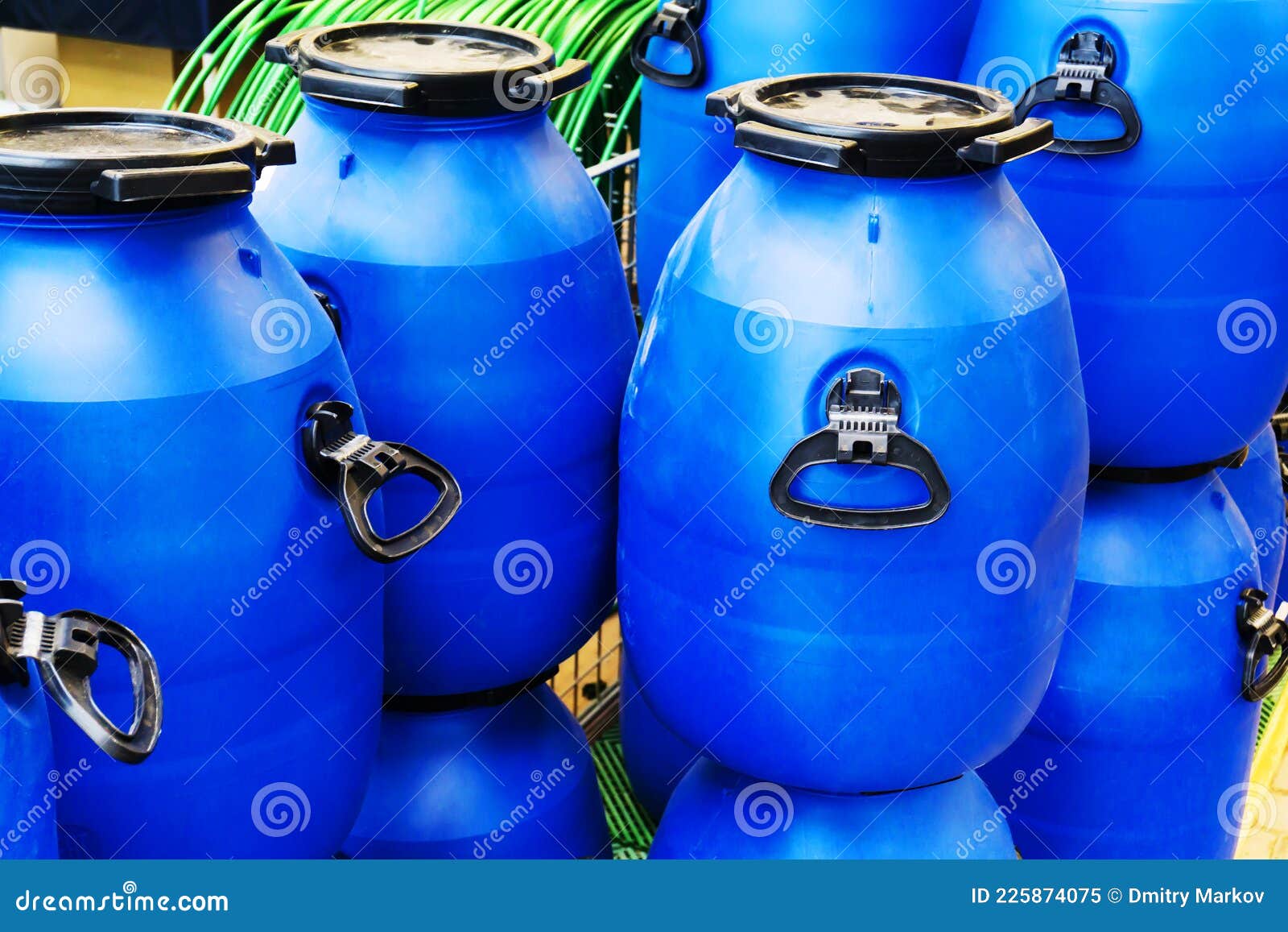 Large Blue Polymer Drums. Plastic Products for Storing and Transporting ...