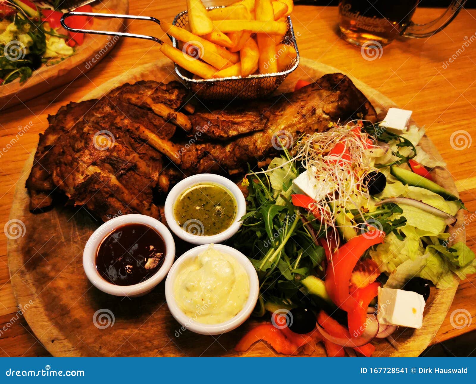 Large Pork Ribs with Fries and Salad with Different Sauces 库存图片 - 图片 包括 ...