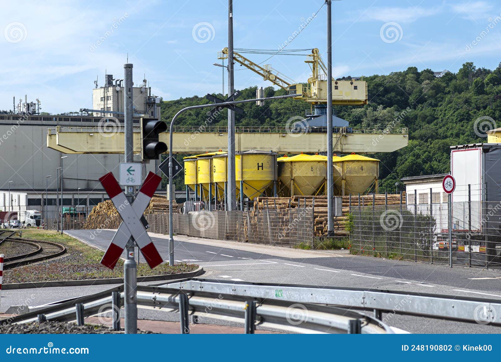 A Large Port Crane on Rails Standing on the Loading Yard, Visible ...