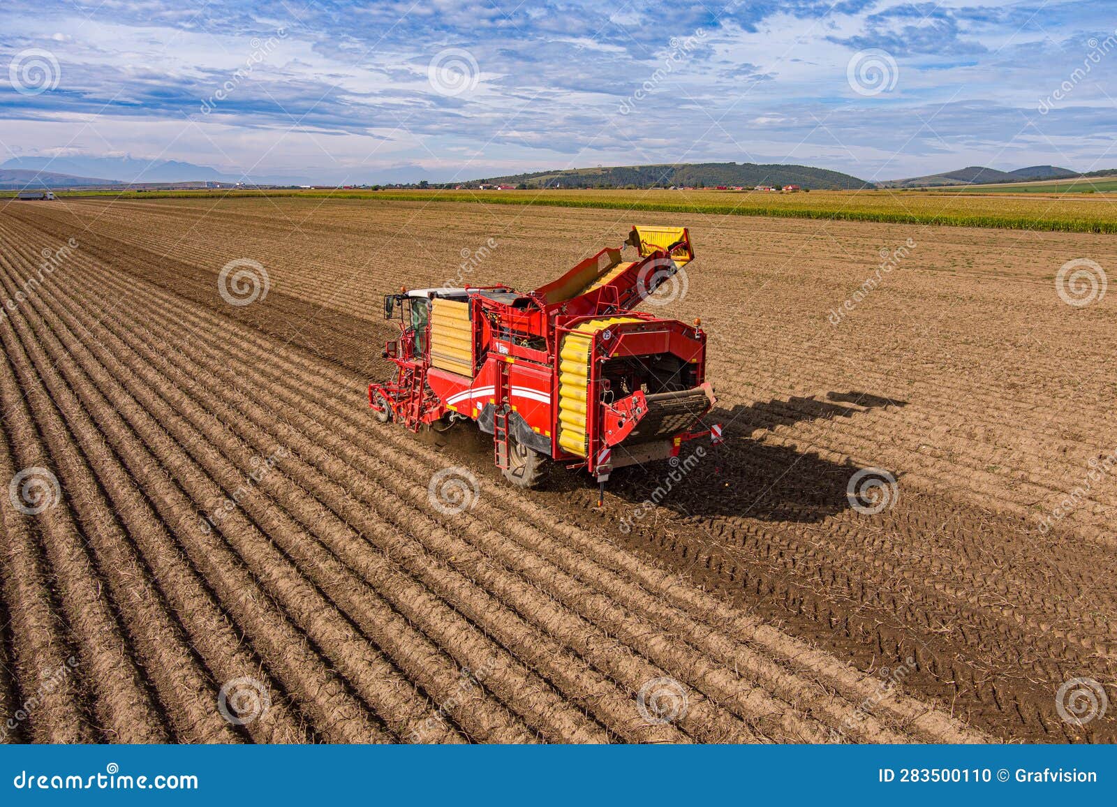 Large potato harvester stock photo. Image of field, grow - 283500110