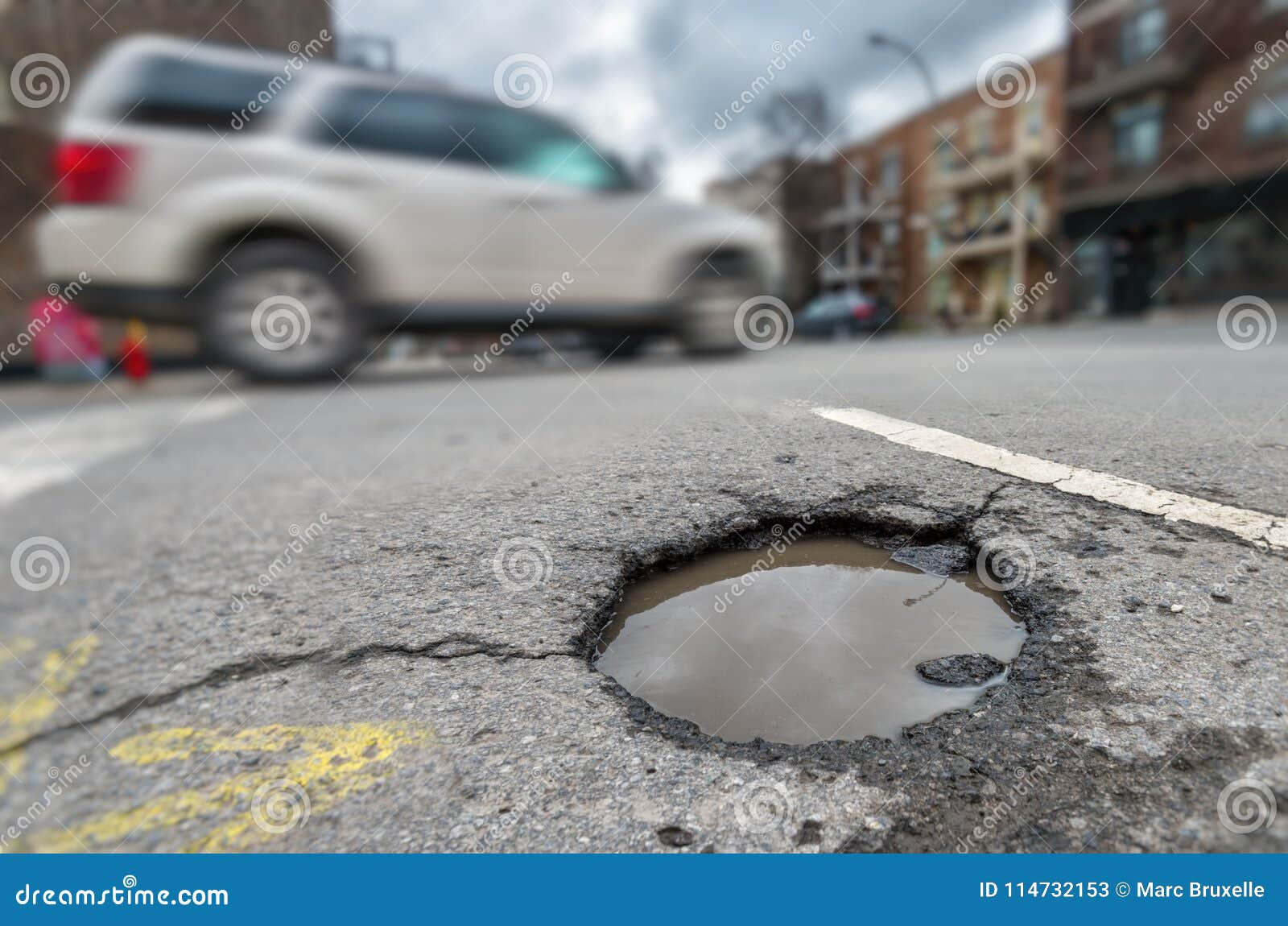 Large pothole in Montreal stock image. Image of holes - 114732153